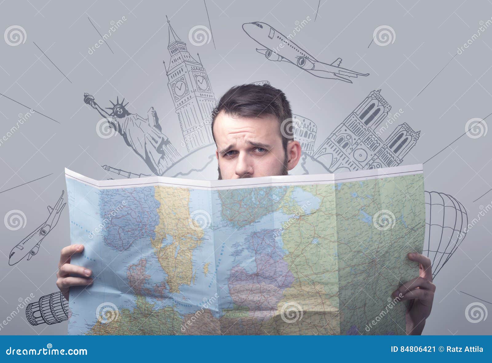 Young man holding map stock image. Image of interest - 84806421