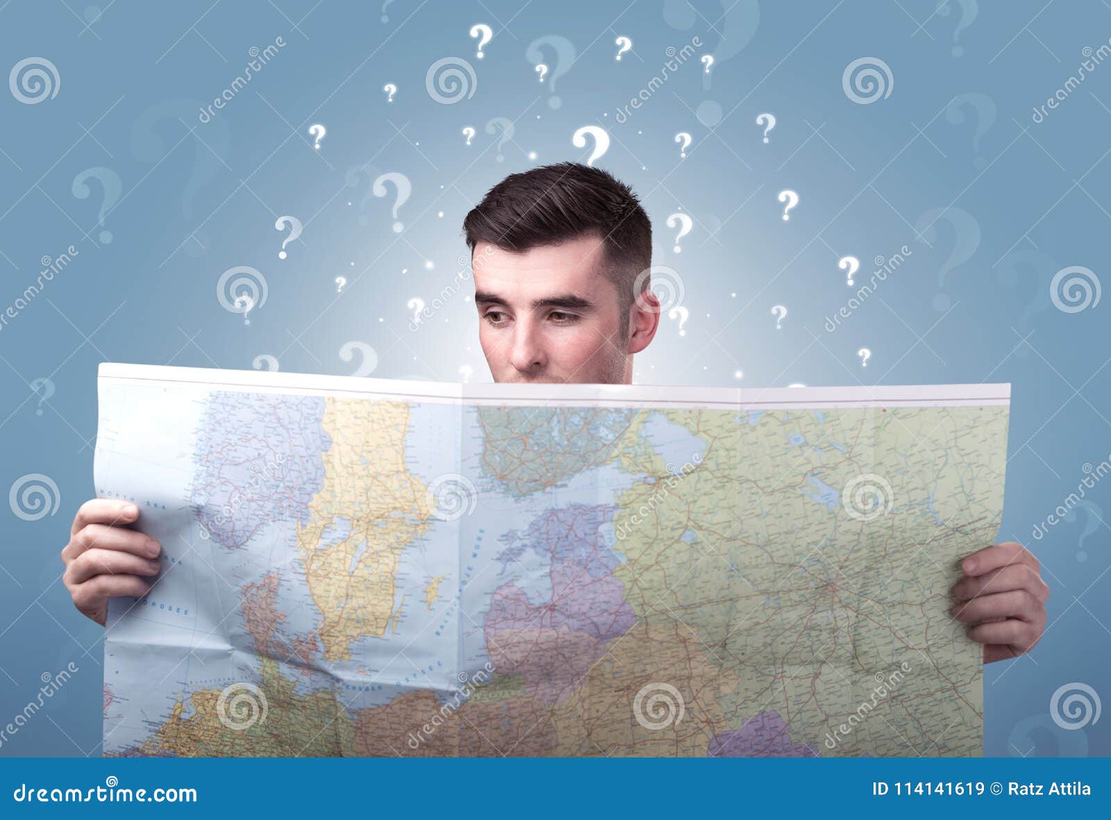 Young man holding map stock image. Image of hobby, lifestyle - 114141619