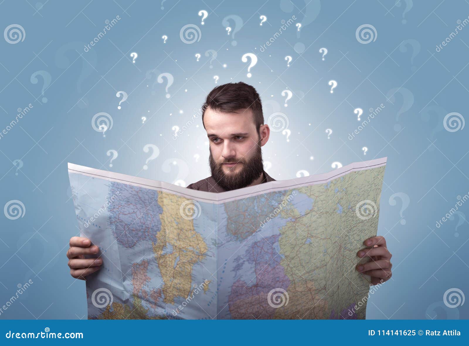 Young man holding map stock image. Image of hobby, leisure - 114141625