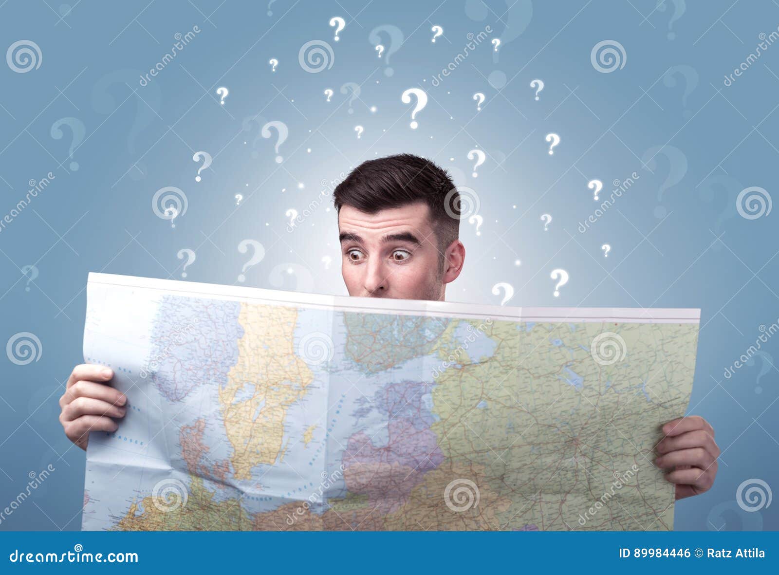 Young man holding map stock photo. Image of itinerary - 89984446