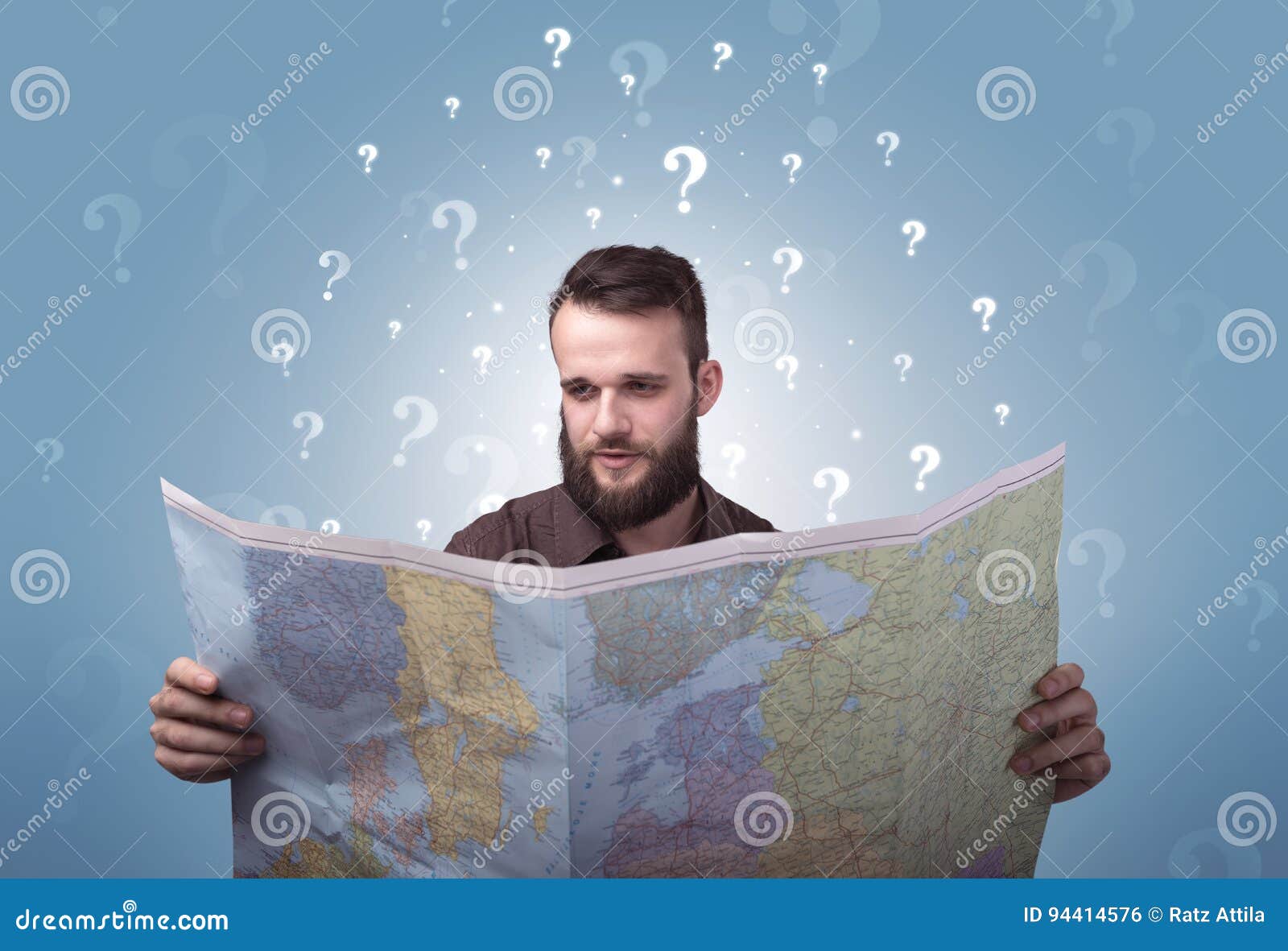 Young man holding map stock photo. Image of excursion - 94414576