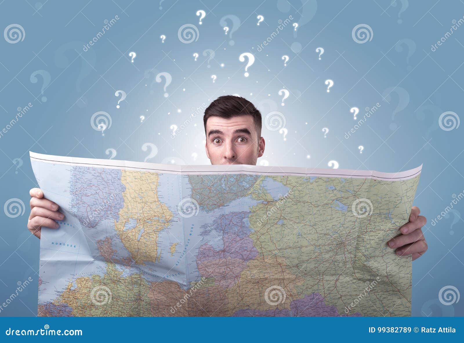 Young man holding map stock image. Image of backpacking - 99382789