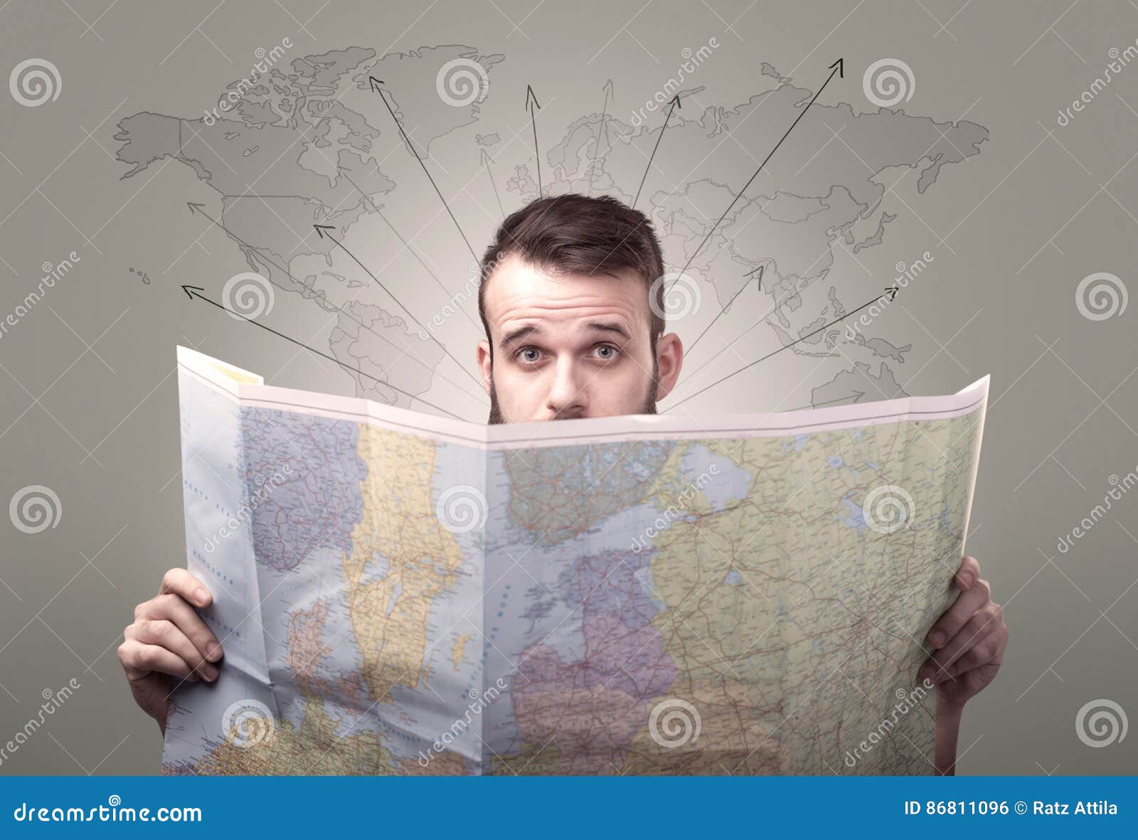 Young man holding map stock photo. Image of caucasian - 86811096