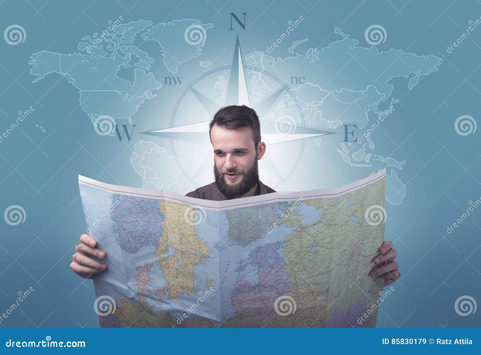 Young man holding map stock image. Image of adventure - 85830179