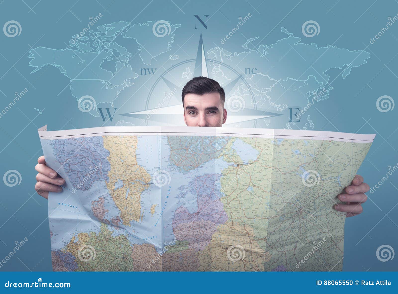 Young man holding map stock photo. Image of direction - 88065550