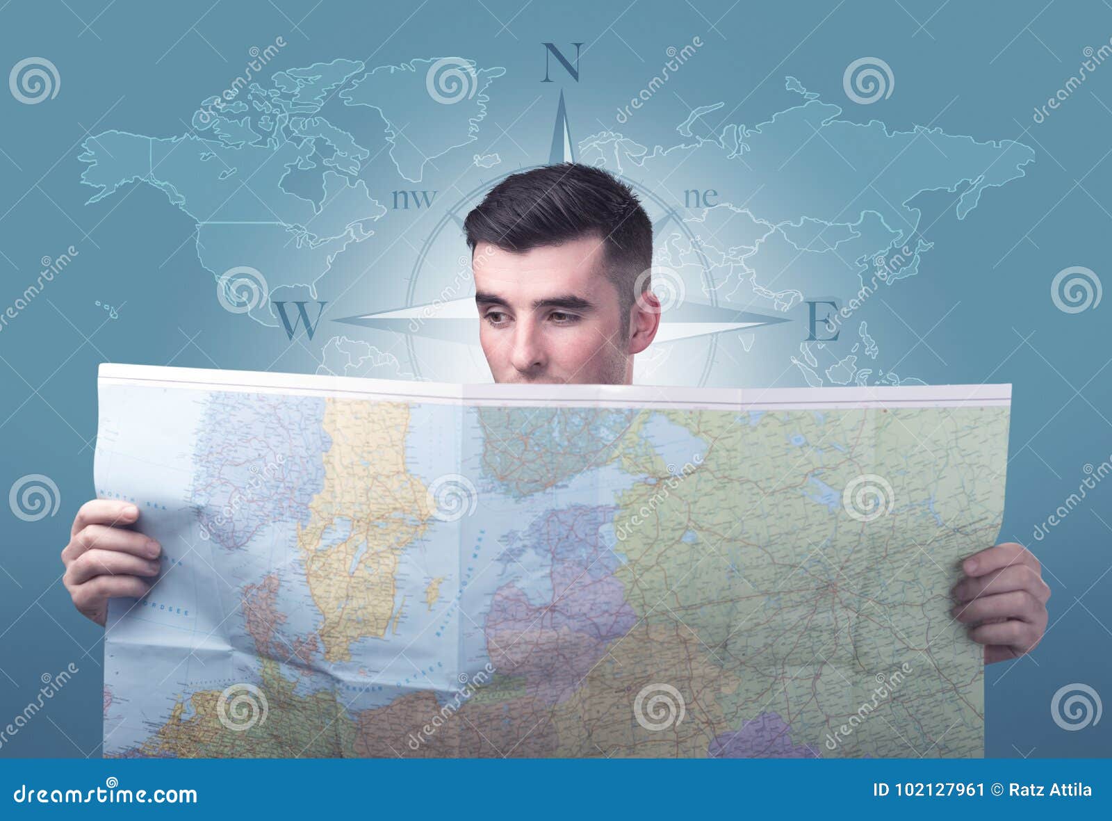 Young man holding map stock image. Image of direction - 102127961