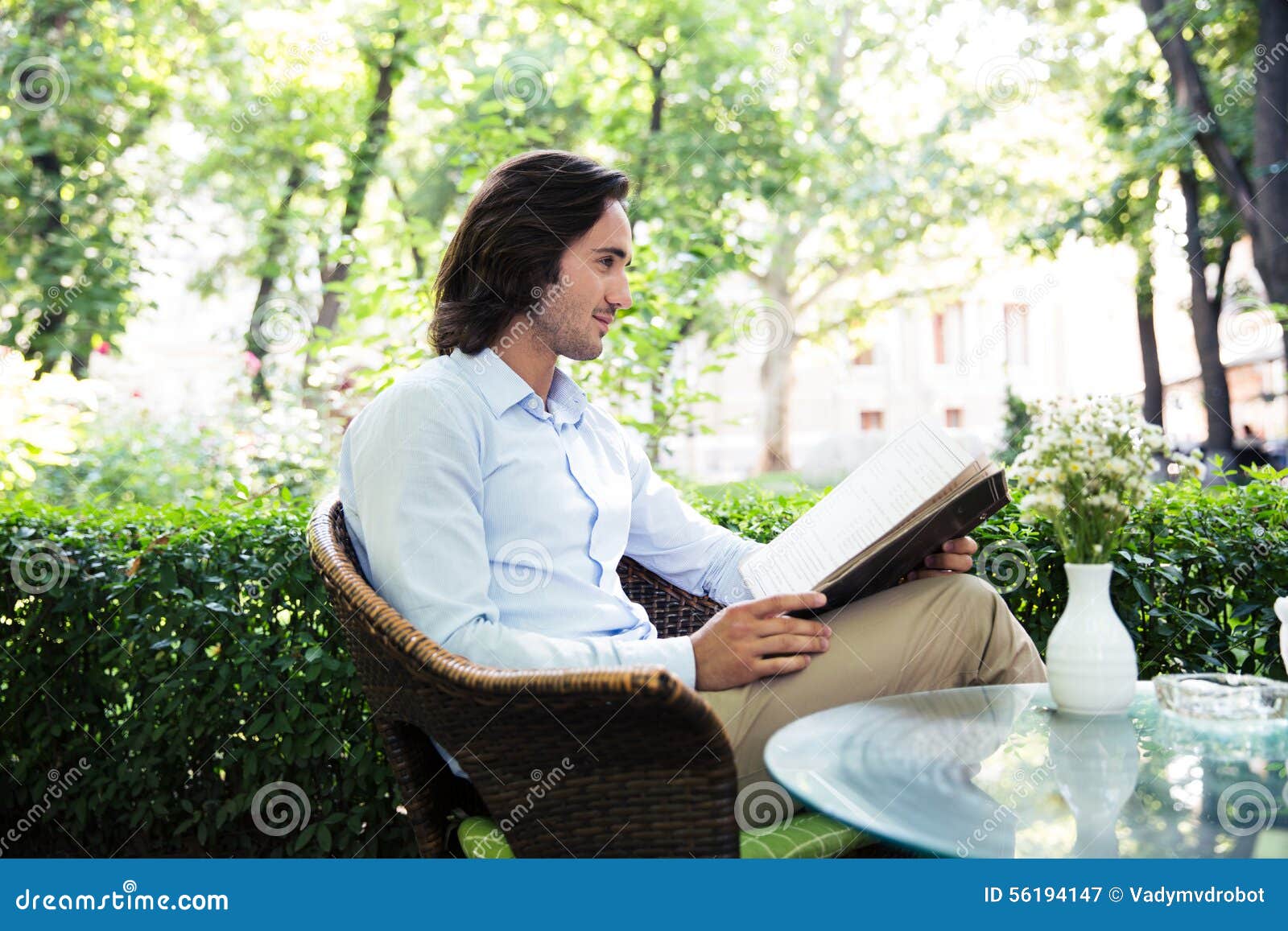 Young Man Holding Menu in Cafe Stock Image - Image of confident ...