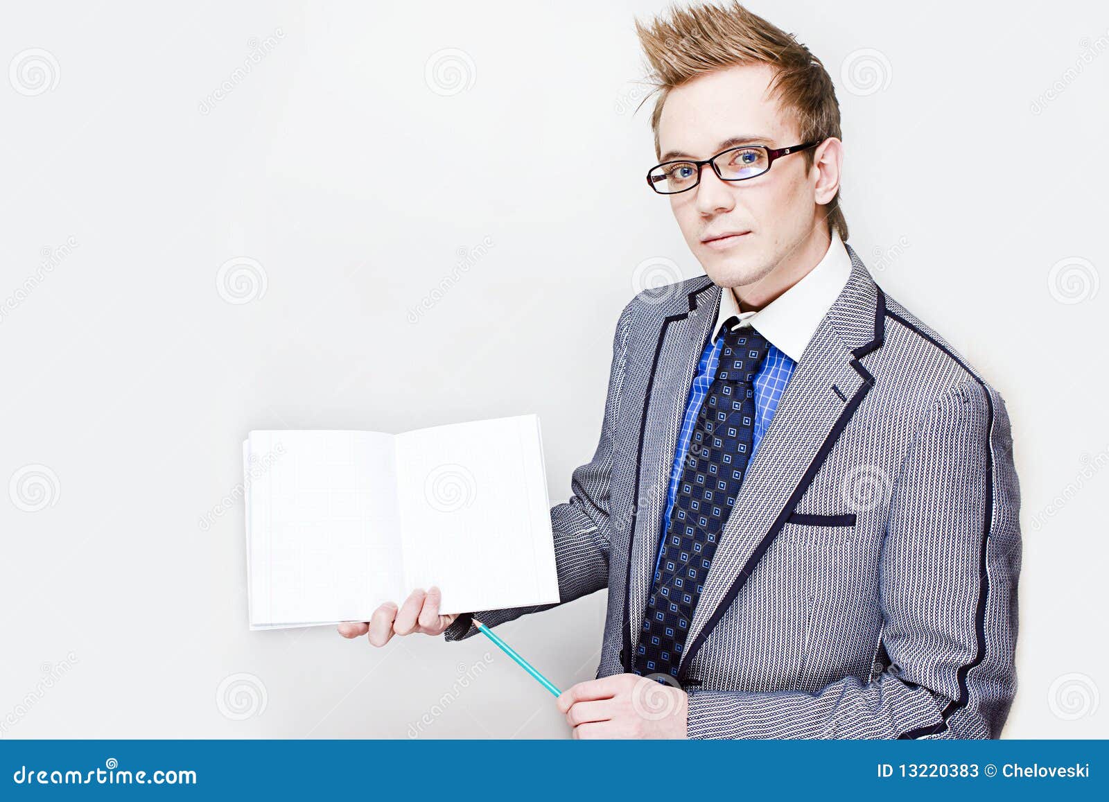 Young man holding a note stock image. Image of showing - 13220383