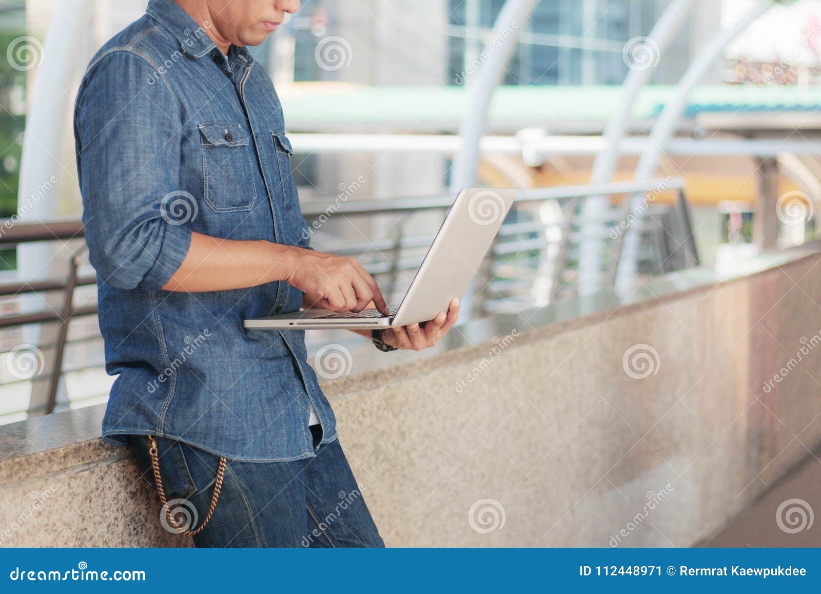 Young Man Holding Notebook Working. Stock Image - Image of computer ...