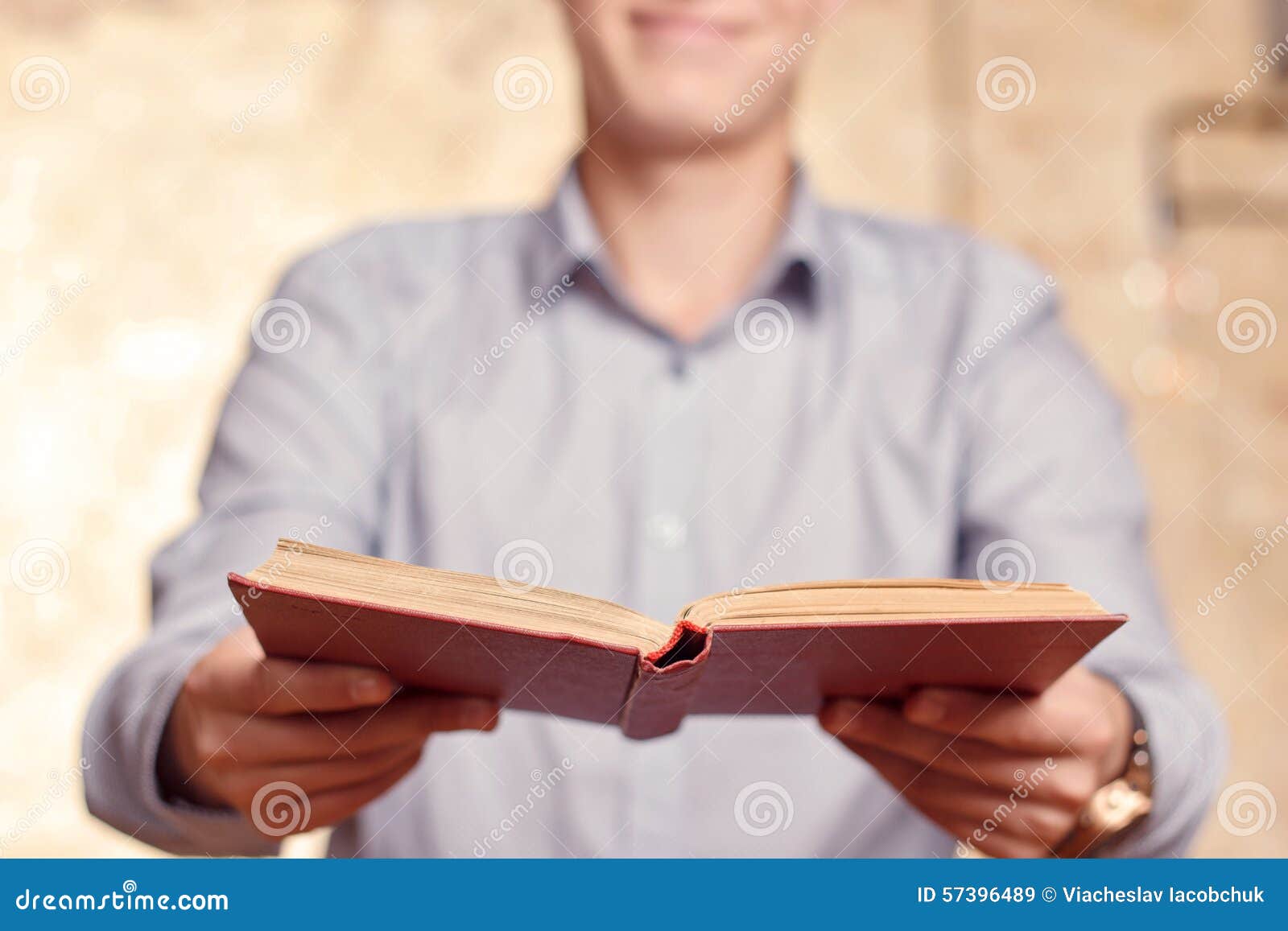 Young Man Holding Opened Book Stock Image - Image of businessman ...