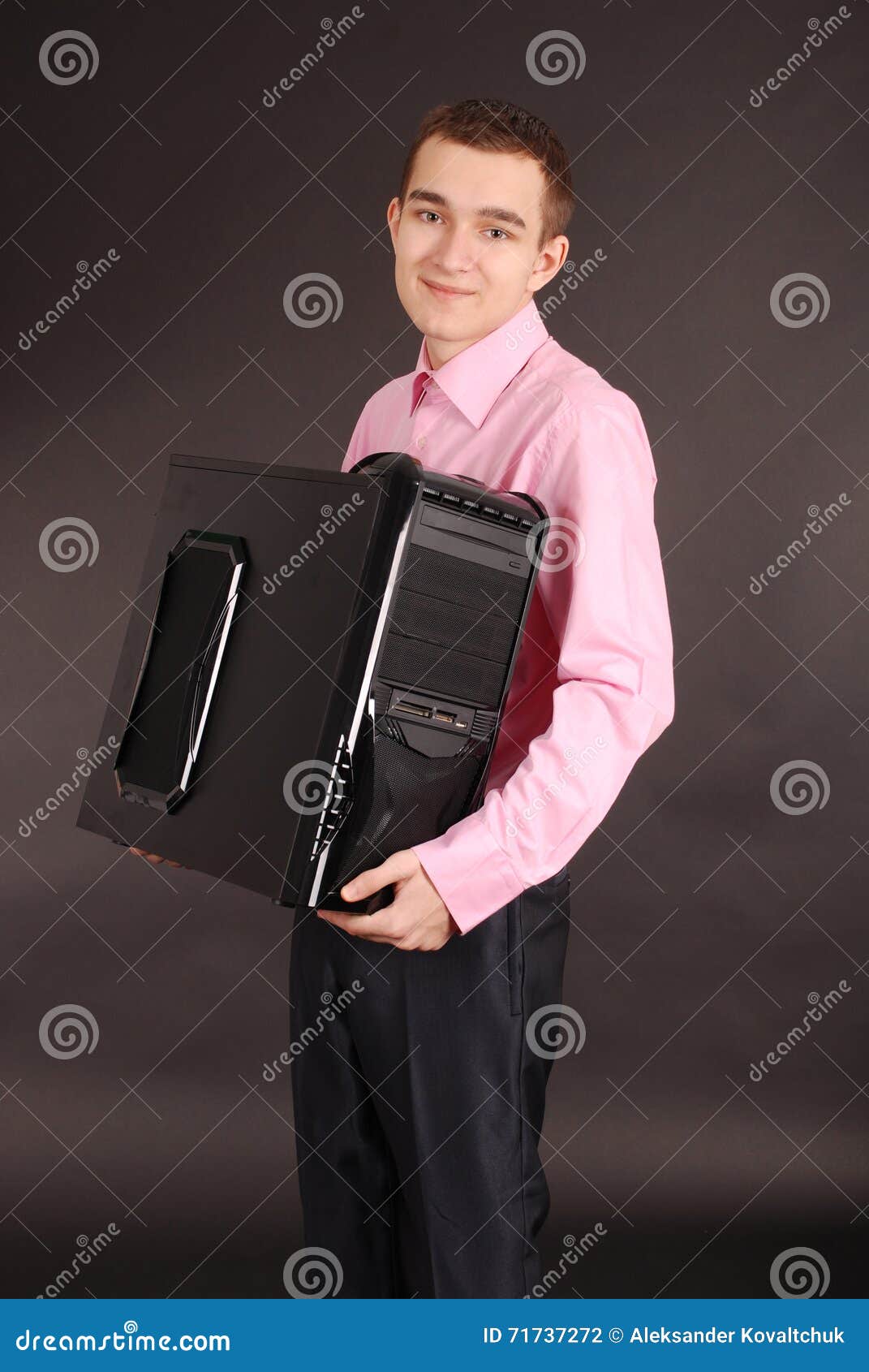 Young Man Holding a Pc Black Stock Photo - Image of hands, soft: 71737272