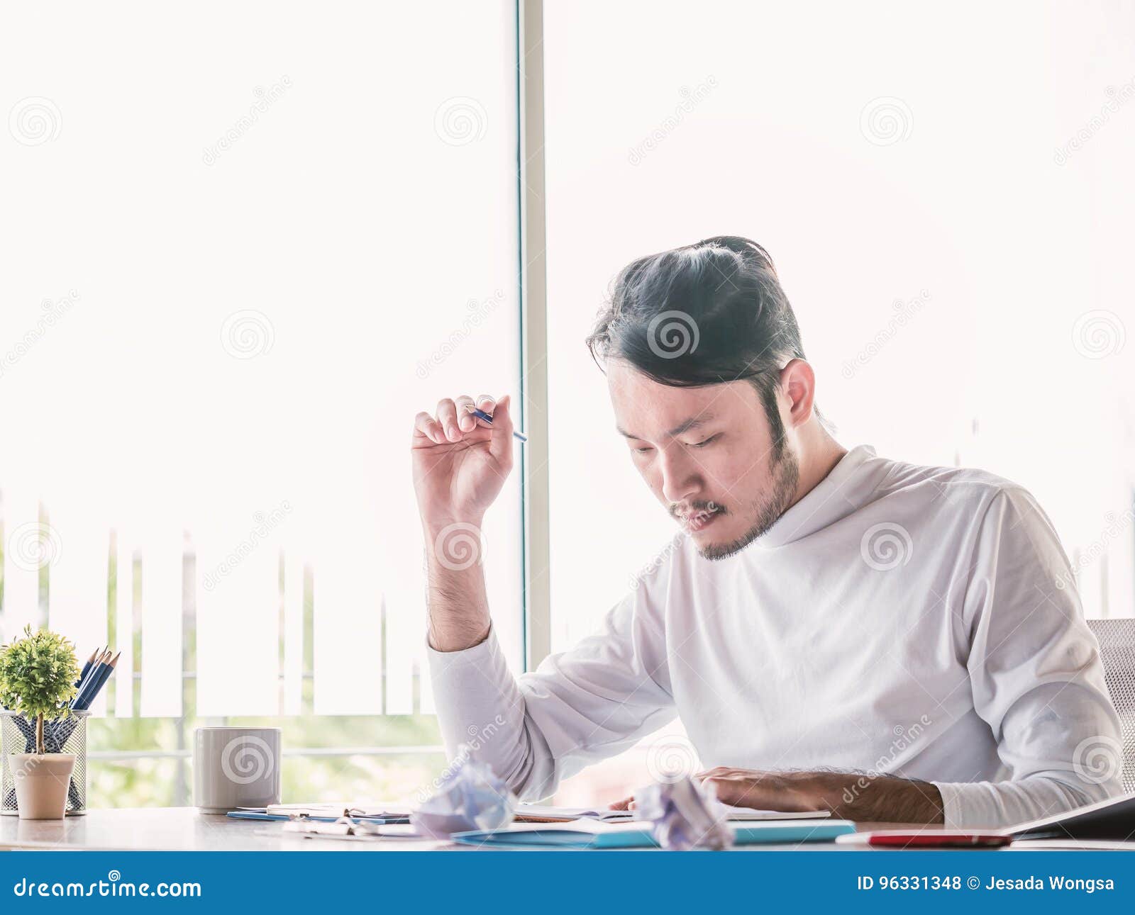 Young Man Holding Pencil with Thinking Stock Photo - Image of office ...