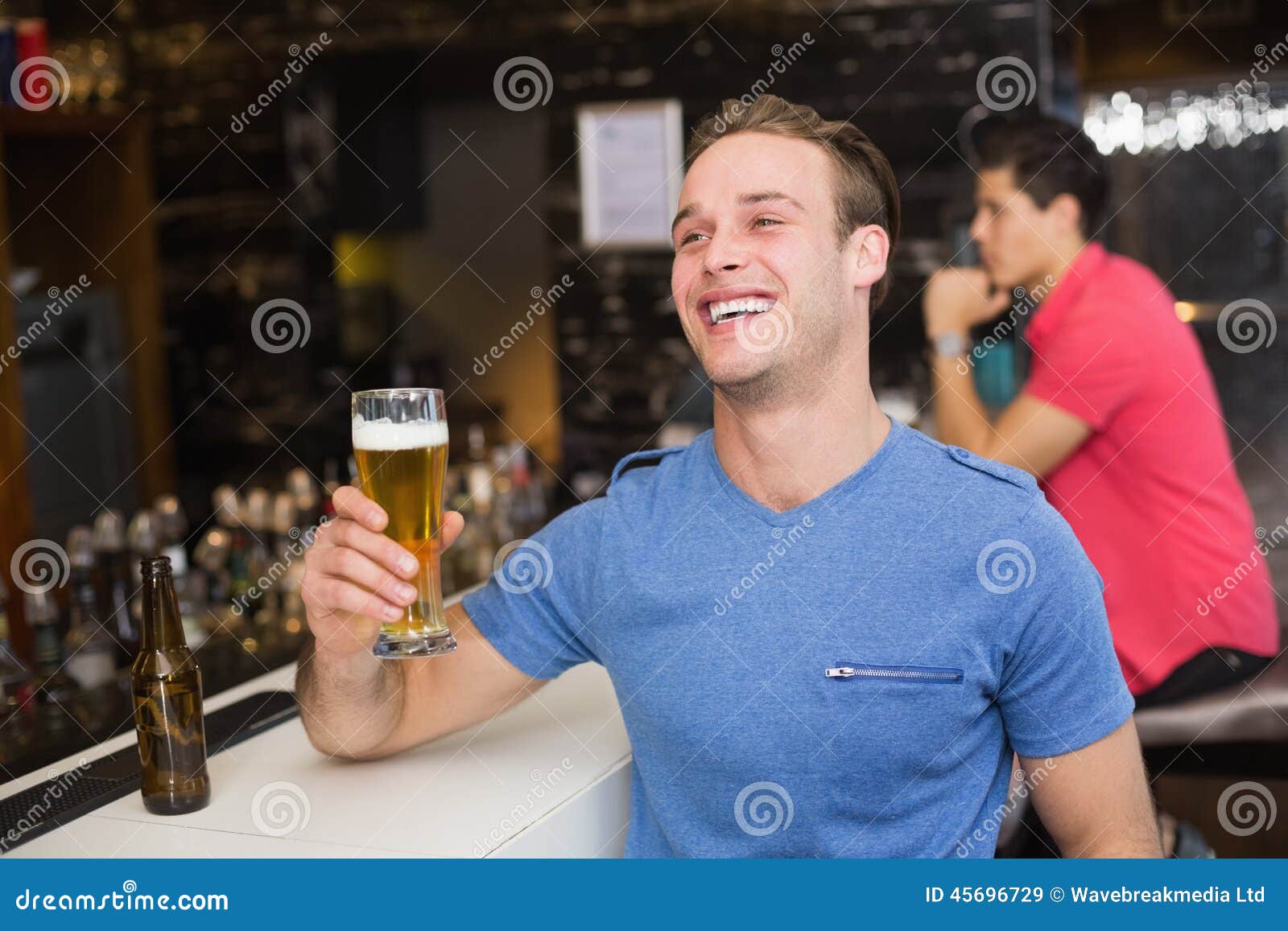 Young Man Holding Pint of Beer Stock Image - Image of beer, length ...