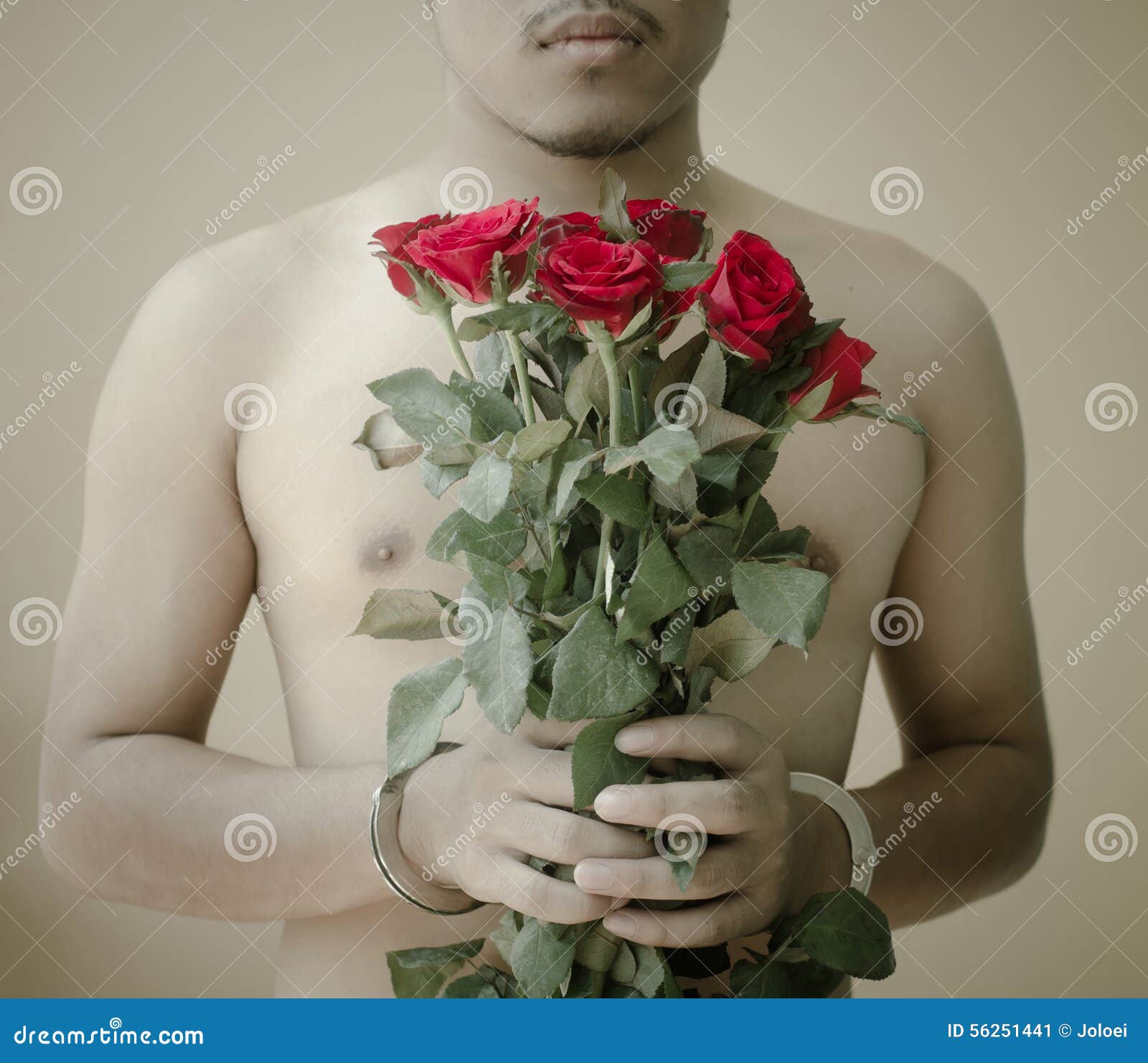Young man holding red rose stock image. Image of shackle - 56251441