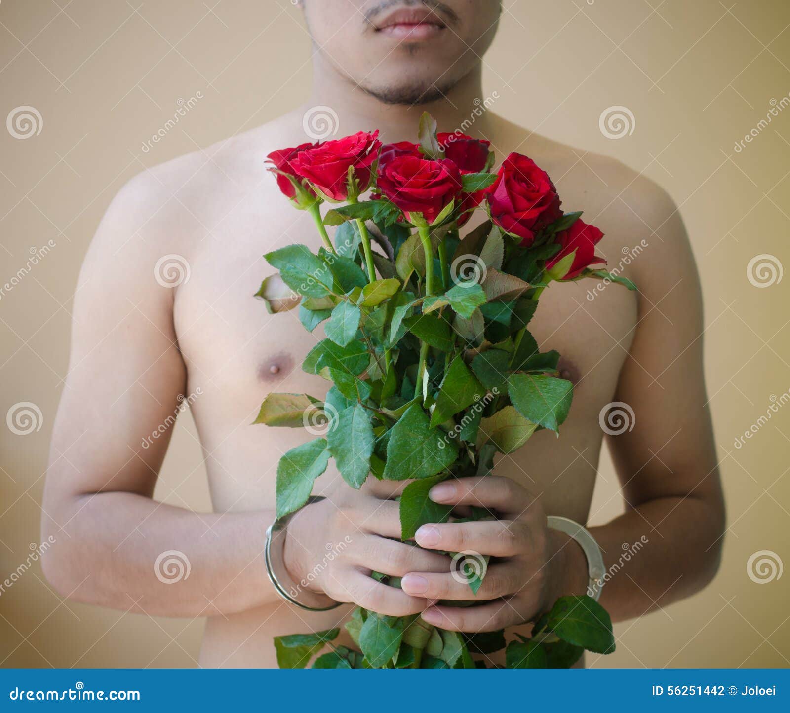 Young man holding red rose stock photo. Image of concept - 56251442
