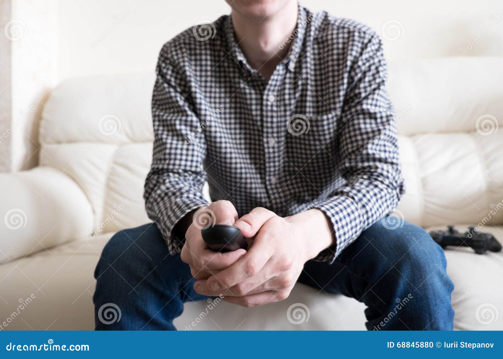 Young Man Holding Remote Controller Stock Photo - Image of remote, sofa ...