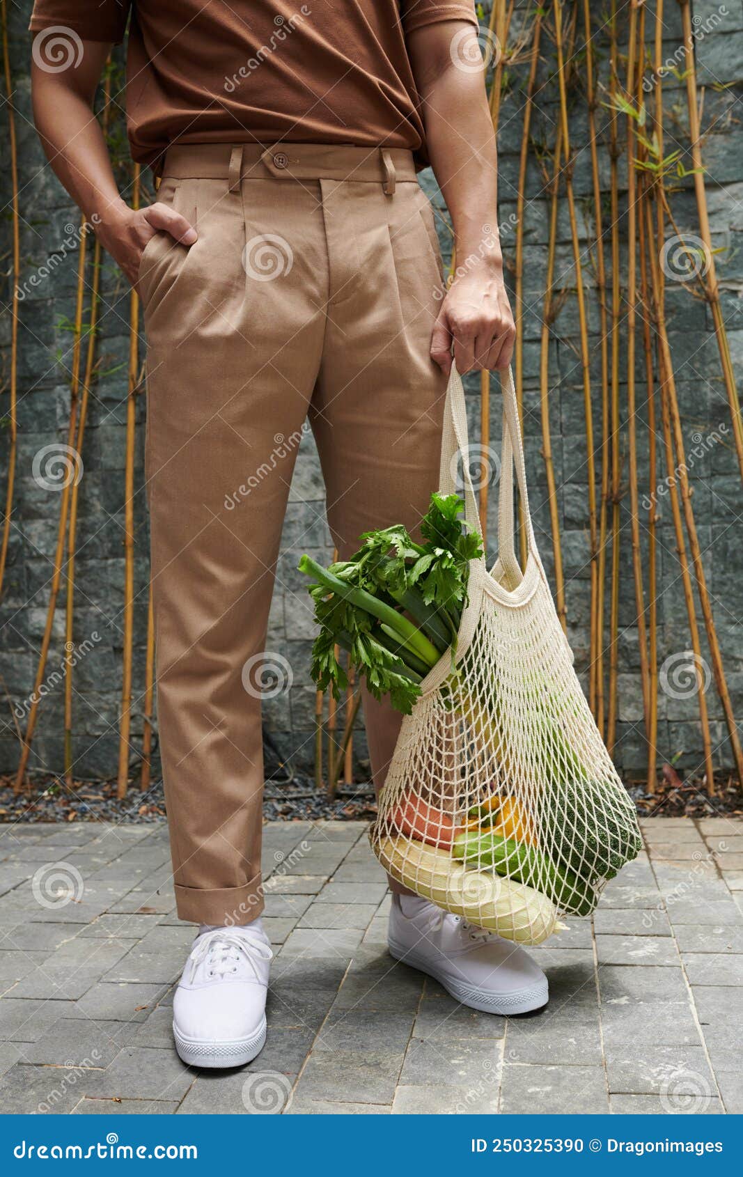 Man Holding Reusable Bag stock photo. Image of market - 250325390