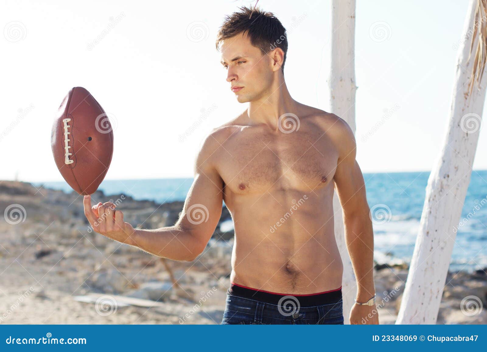 Young Man Holding a Rugby Ball Stock Image - Image of background ...