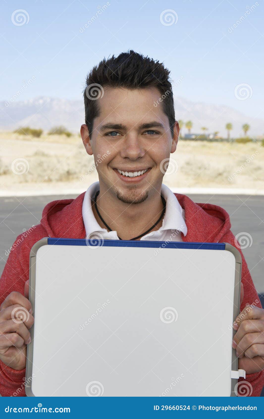Young Man Holding Sign Board Stock Photo - Image of happiness, sign ...