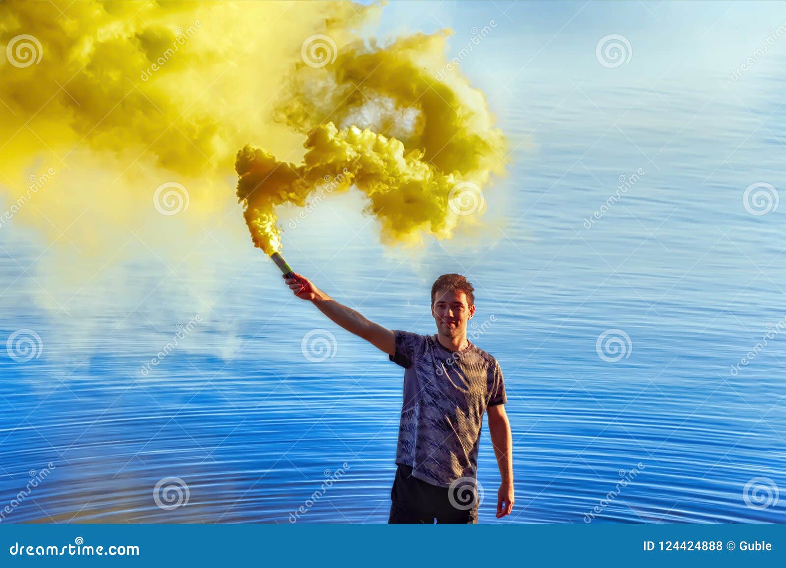 A Young Man Holding a Smoke Bomb. Colored Smoke. Stock Photo - Image of ... A Young Man Holding a Smoke Bomb. Colored Smoke. Stock Photo - Image of ...