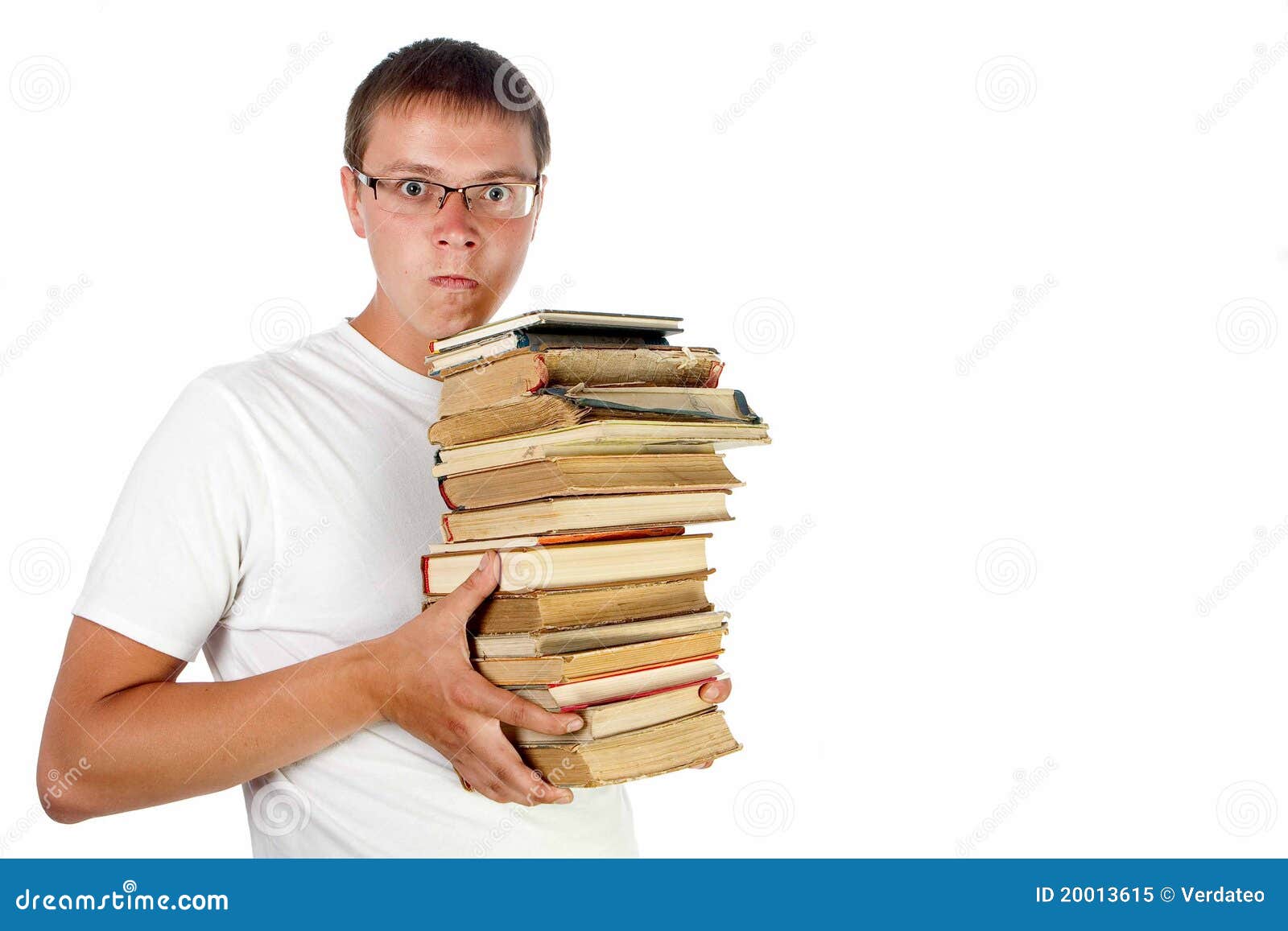 Young Man Holding Stack of Books Stock Image - Image of holding ...