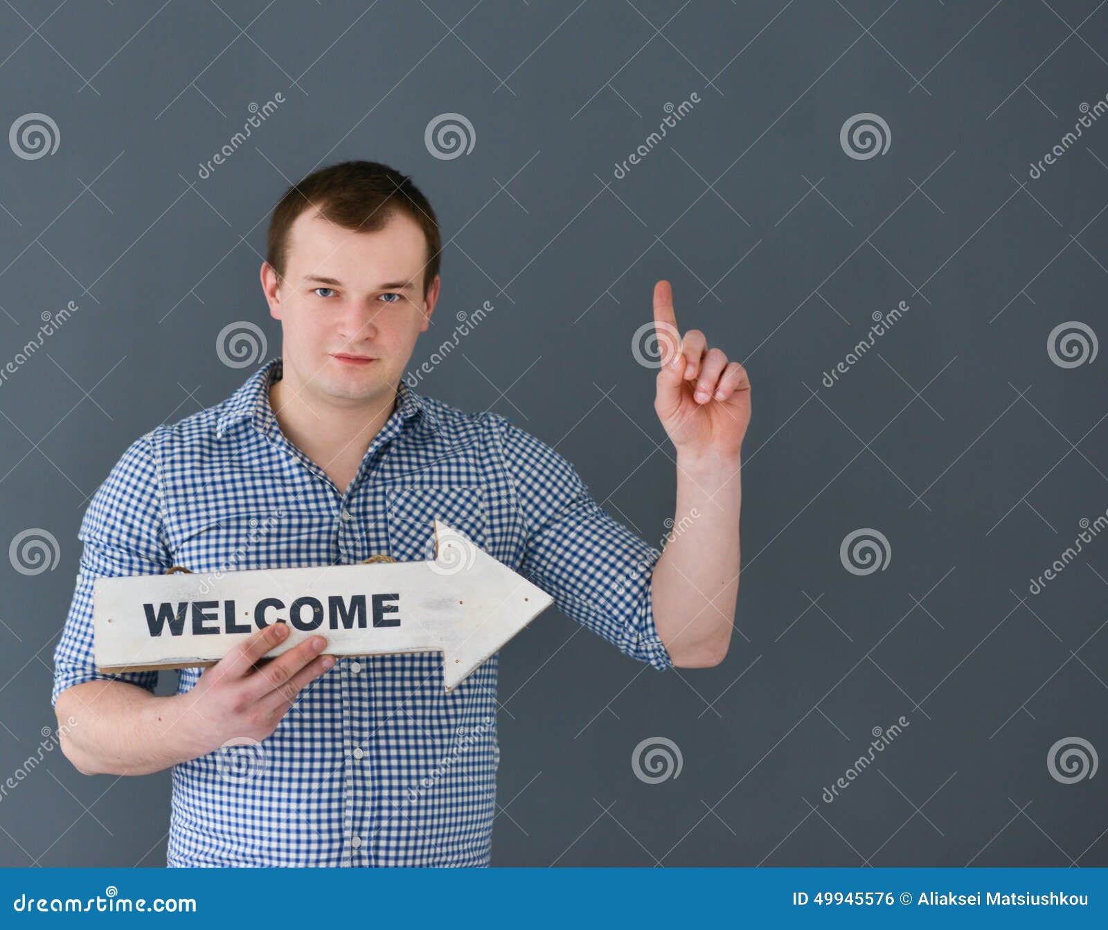 Young Man Holding Welcome Board Banner Stock Photo - Image of ...