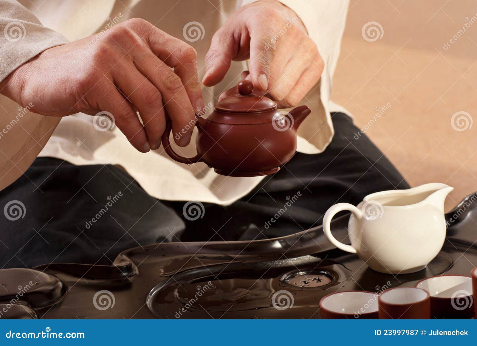 A Young Man Holds a Chinese Tea Ceremony Stock Image - Image of human ...