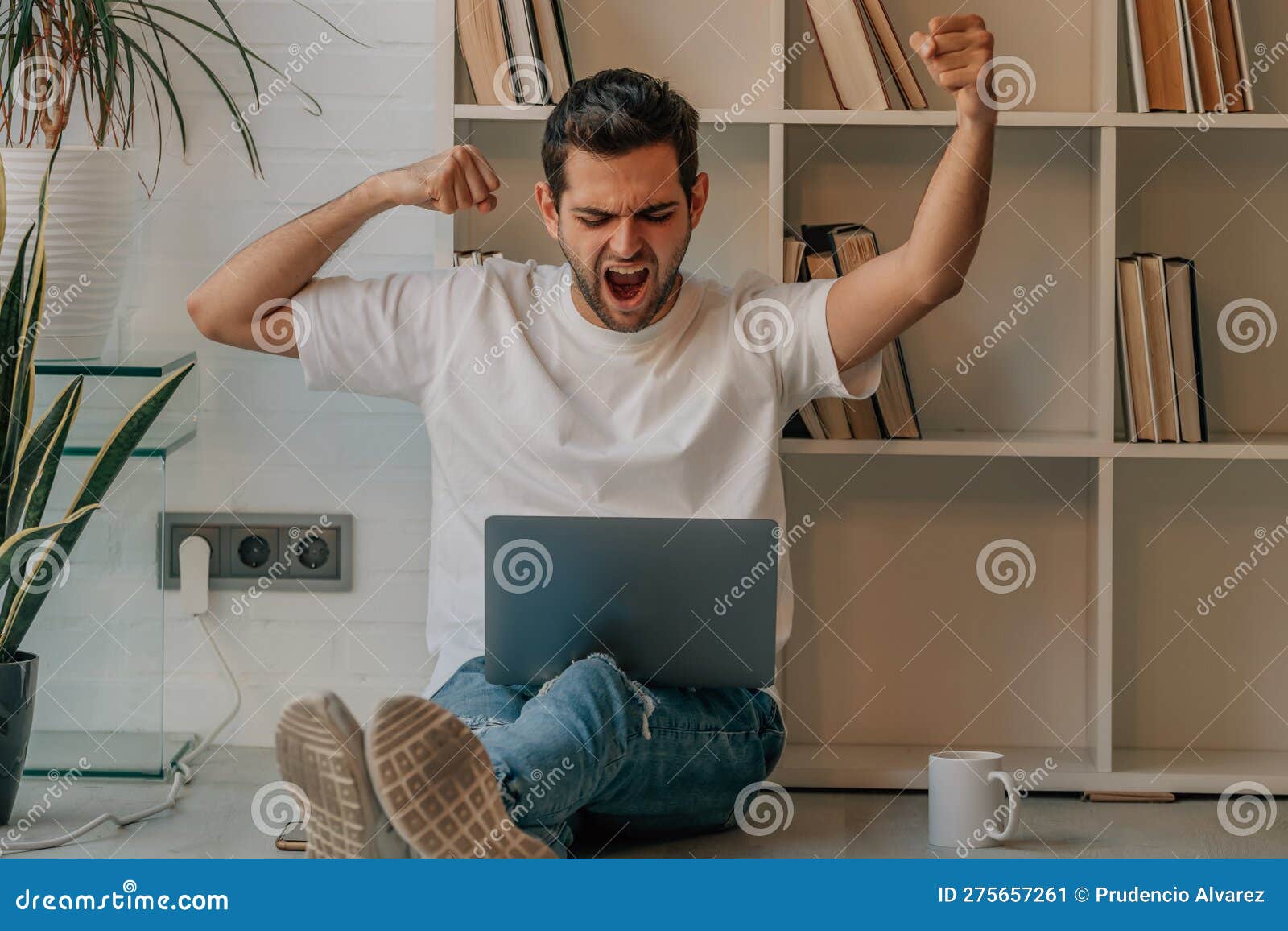 Young Man at Home Elated with Laptop Stock Image - Image of computer ...