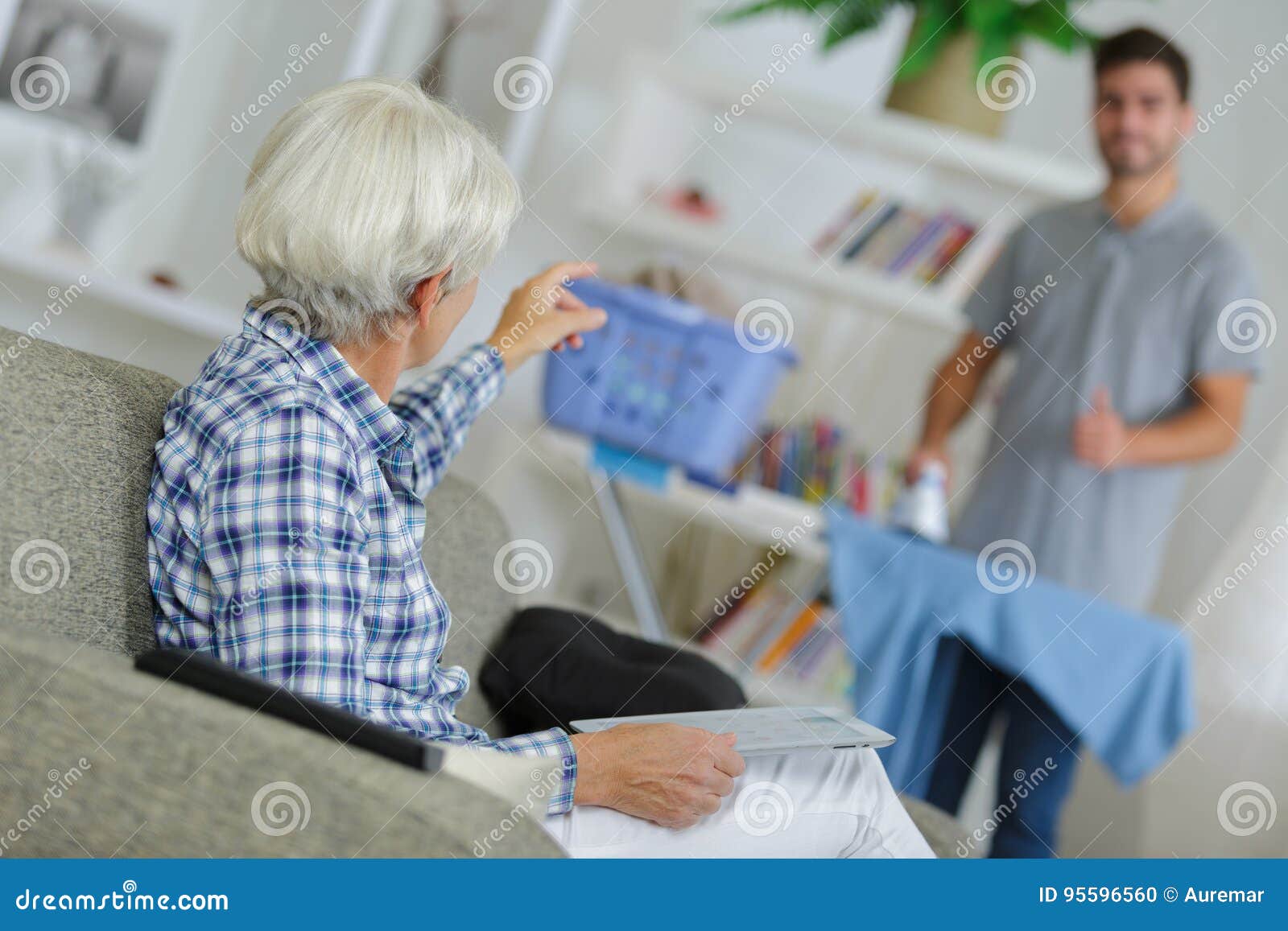 Young Man Home Help Older Woman Stock Photo - Image of patient, care ...