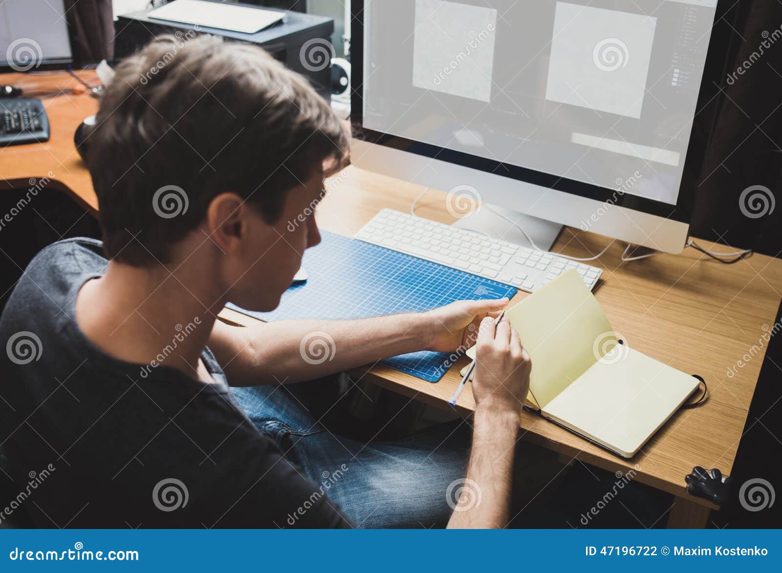 Young Man at Home Using a Computer Stock Photo - Image of screen ...