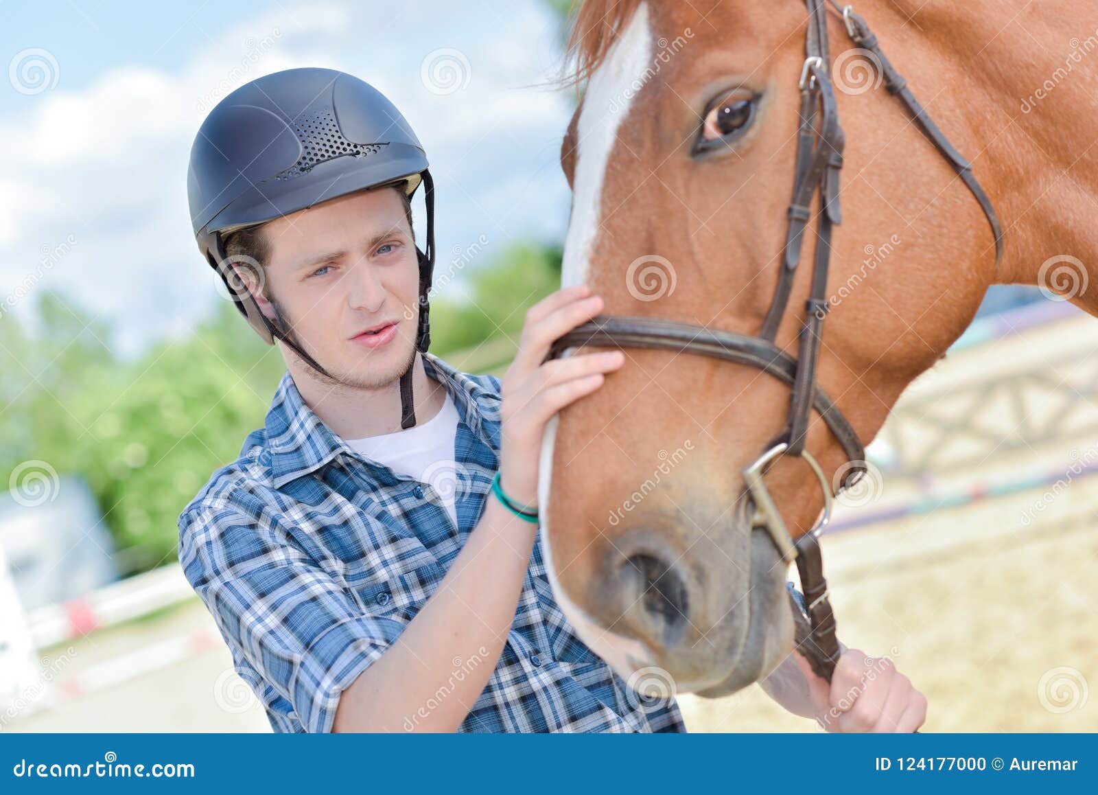 Young man with horse stock photo. Image of lesson, headgear - 124177000