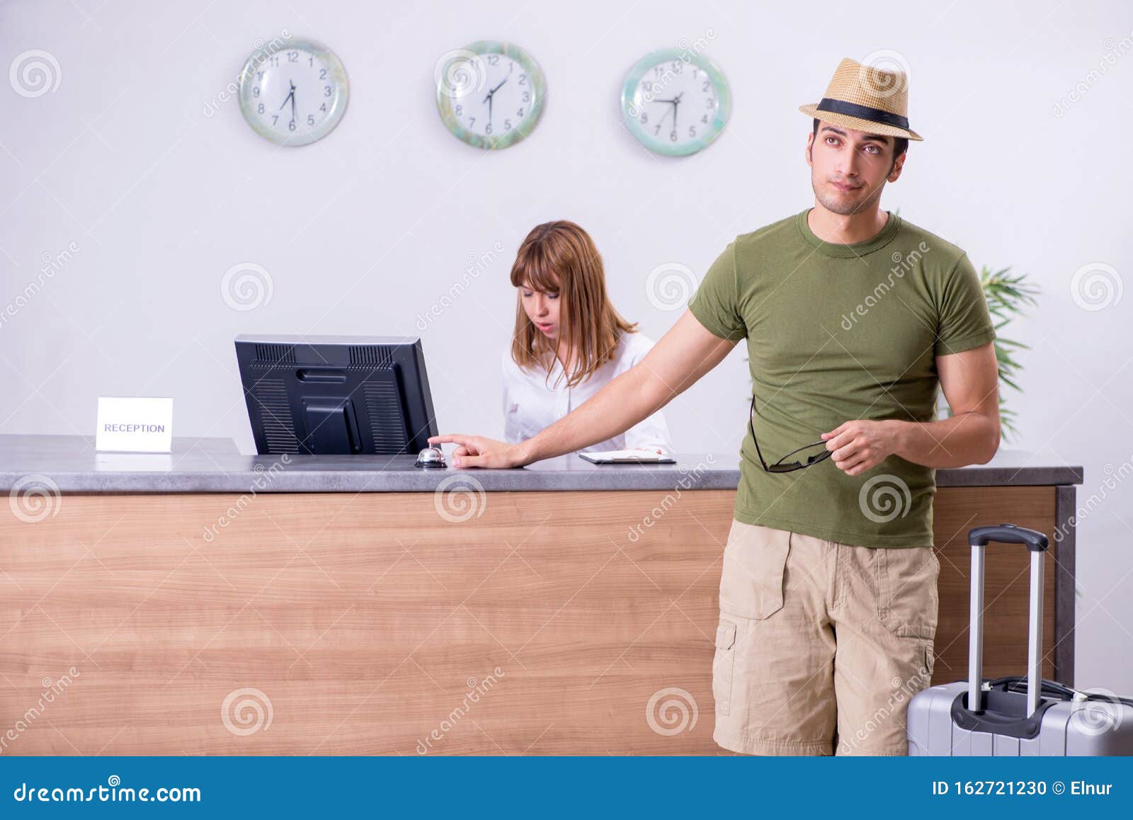 Young Man at the Hotel Reception Stock Photo - Image of lounge, button ...