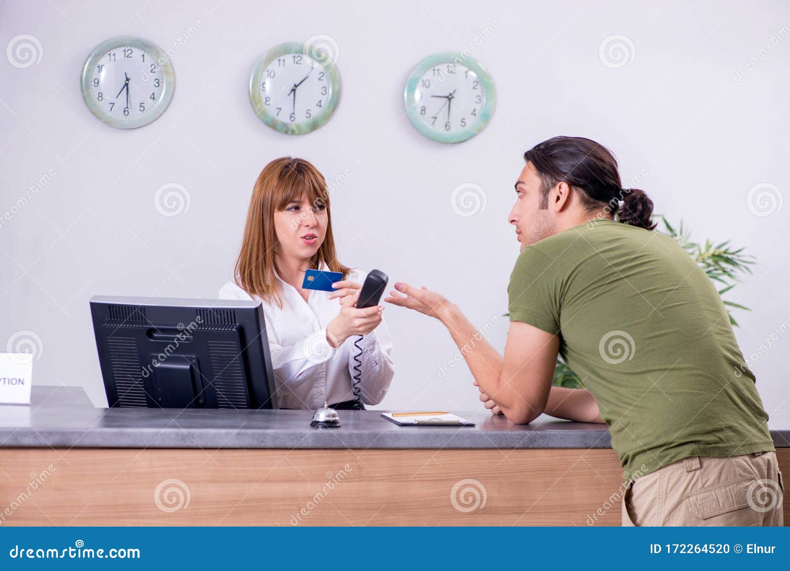 Young Man at the Hotel Reception Stock Photo - Image of phone, card ...
