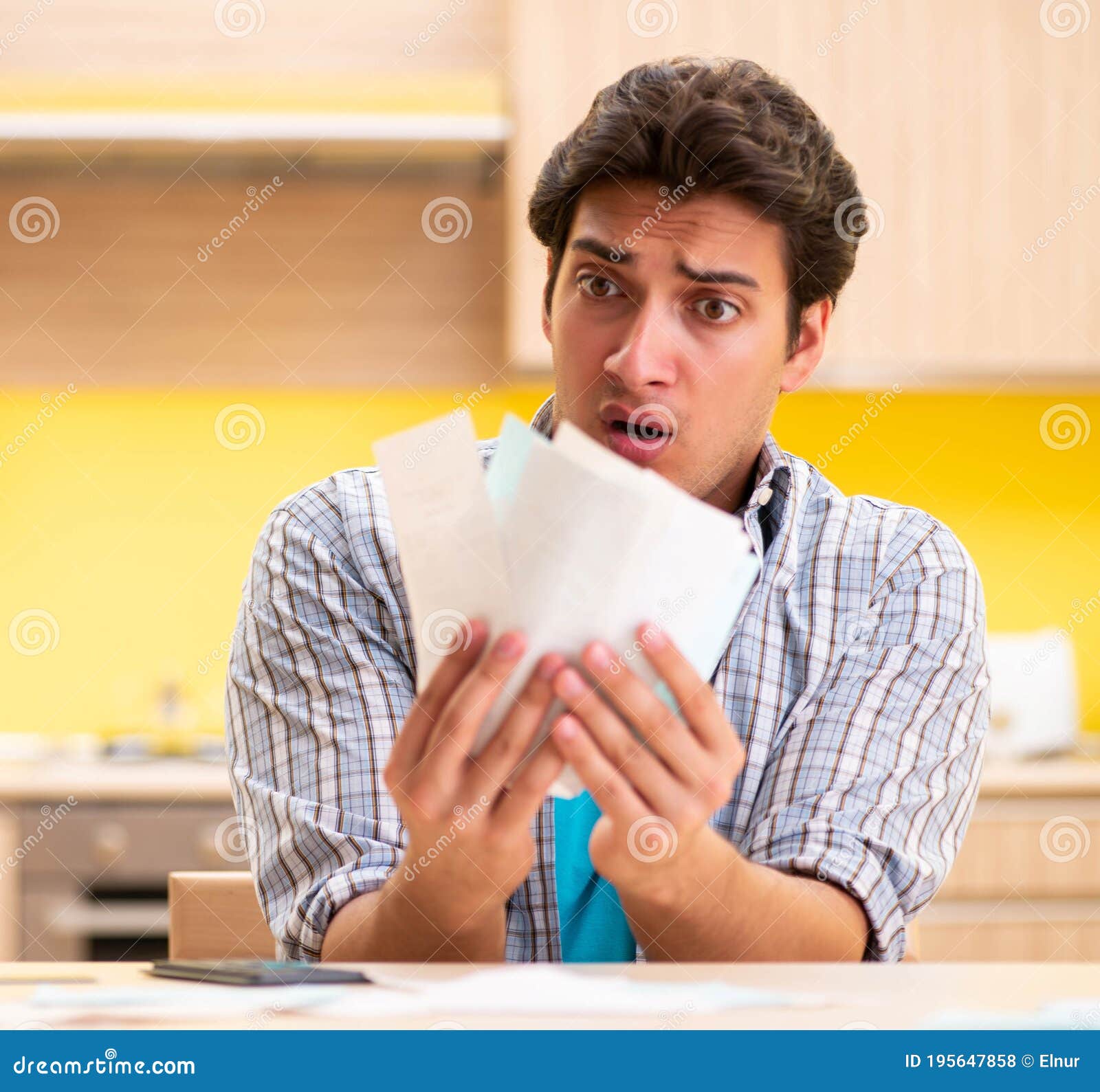 Young Man Husband in Budget Planning Concept Stock Photo - Image of ...