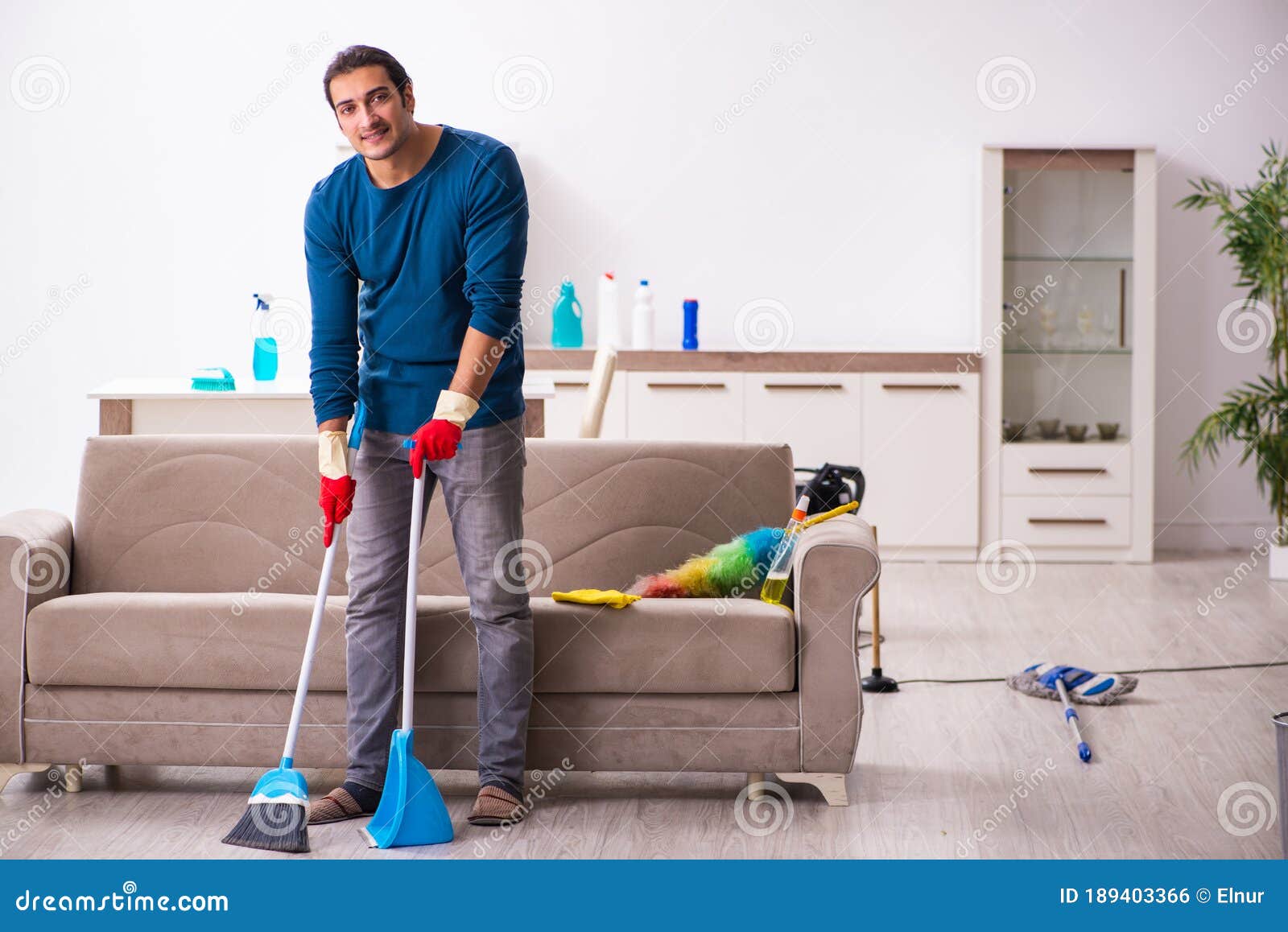 Young Man Husband Doing Housework at Home Stock Photo - Image of ...