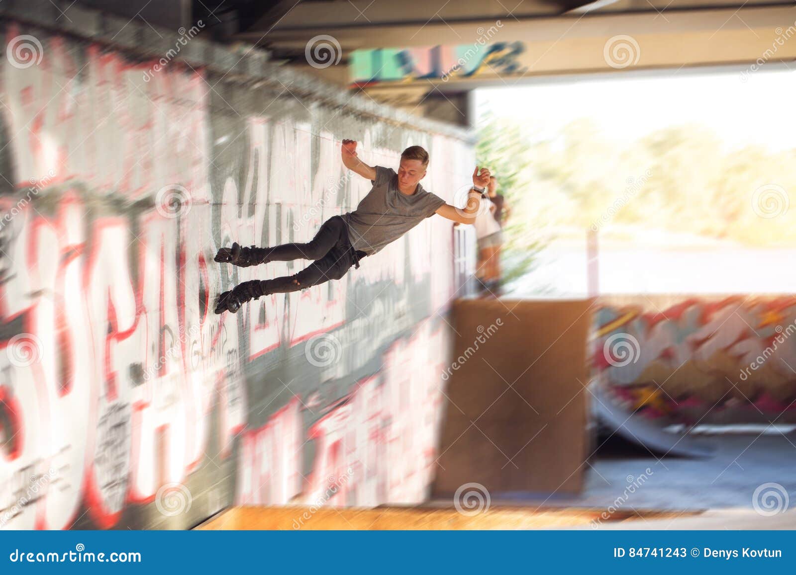 Young Man on Inline Skates. Stock Image - Image of skate, focus: 84741243