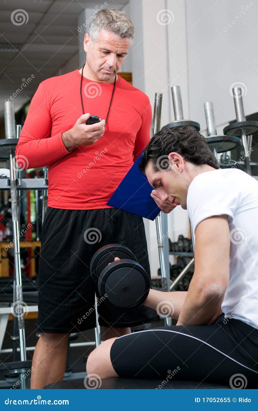 Young Man with Instructor at Gym Stock Image - Image of fitness ...