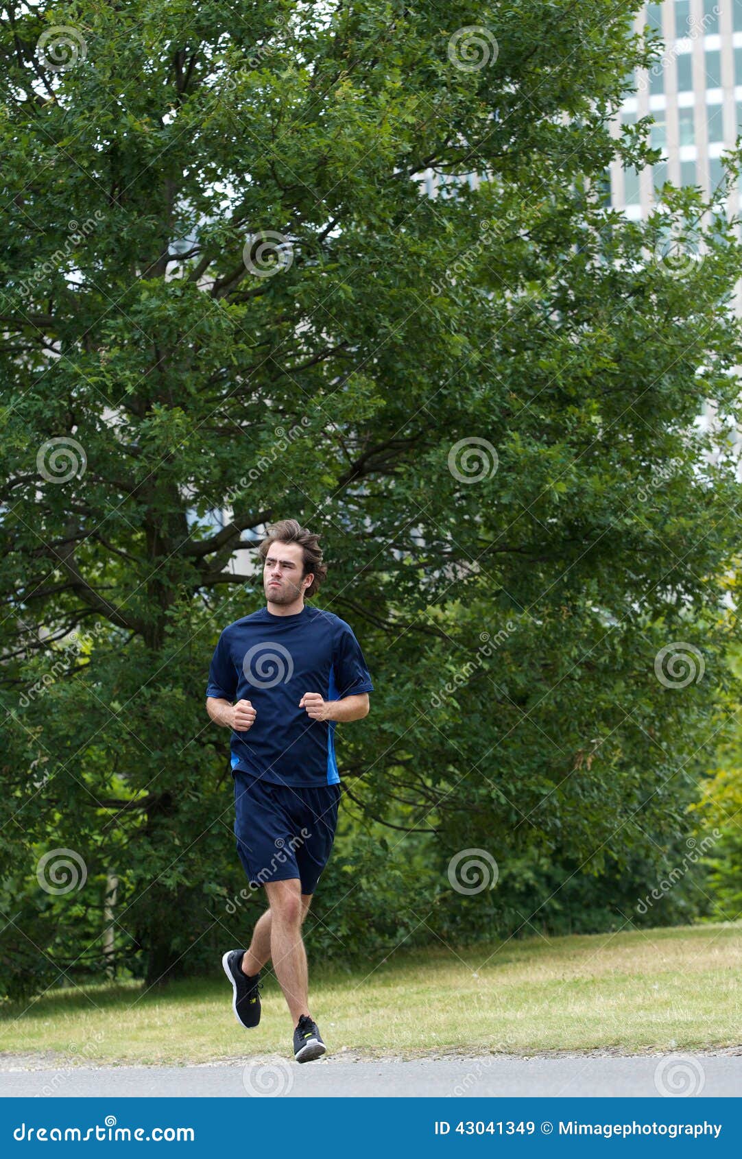 Young man jogging alone stock image. Image of alone, caucasian - 43041349