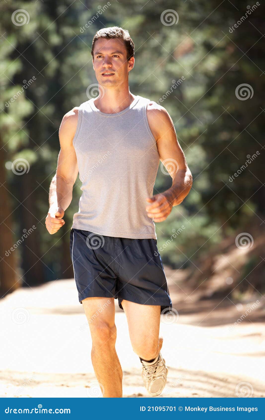 Young Man Jogging through the Countryside Stock Image - Image of ...