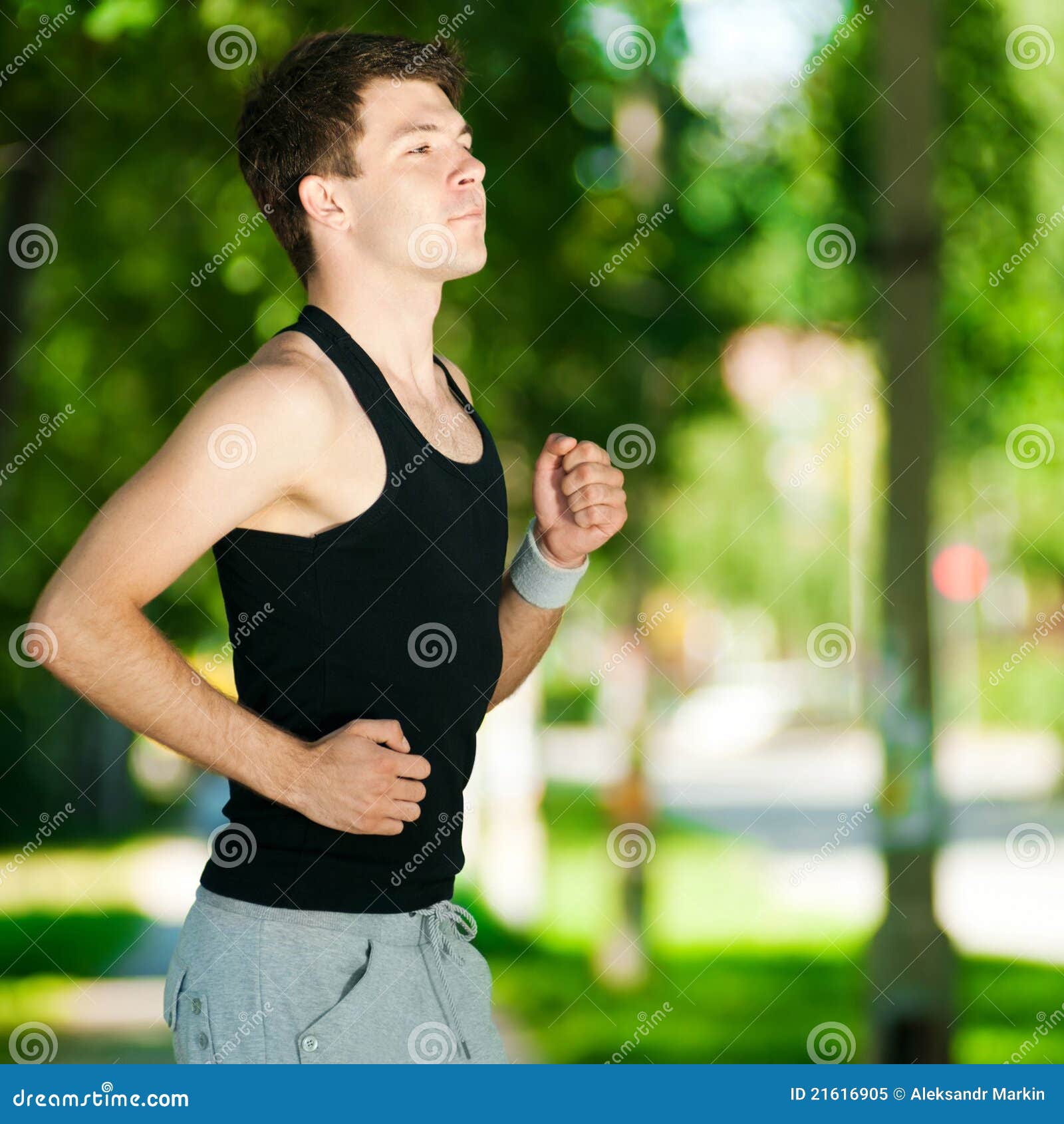 Young man jogging in park stock image. Image of fitness - 21616905