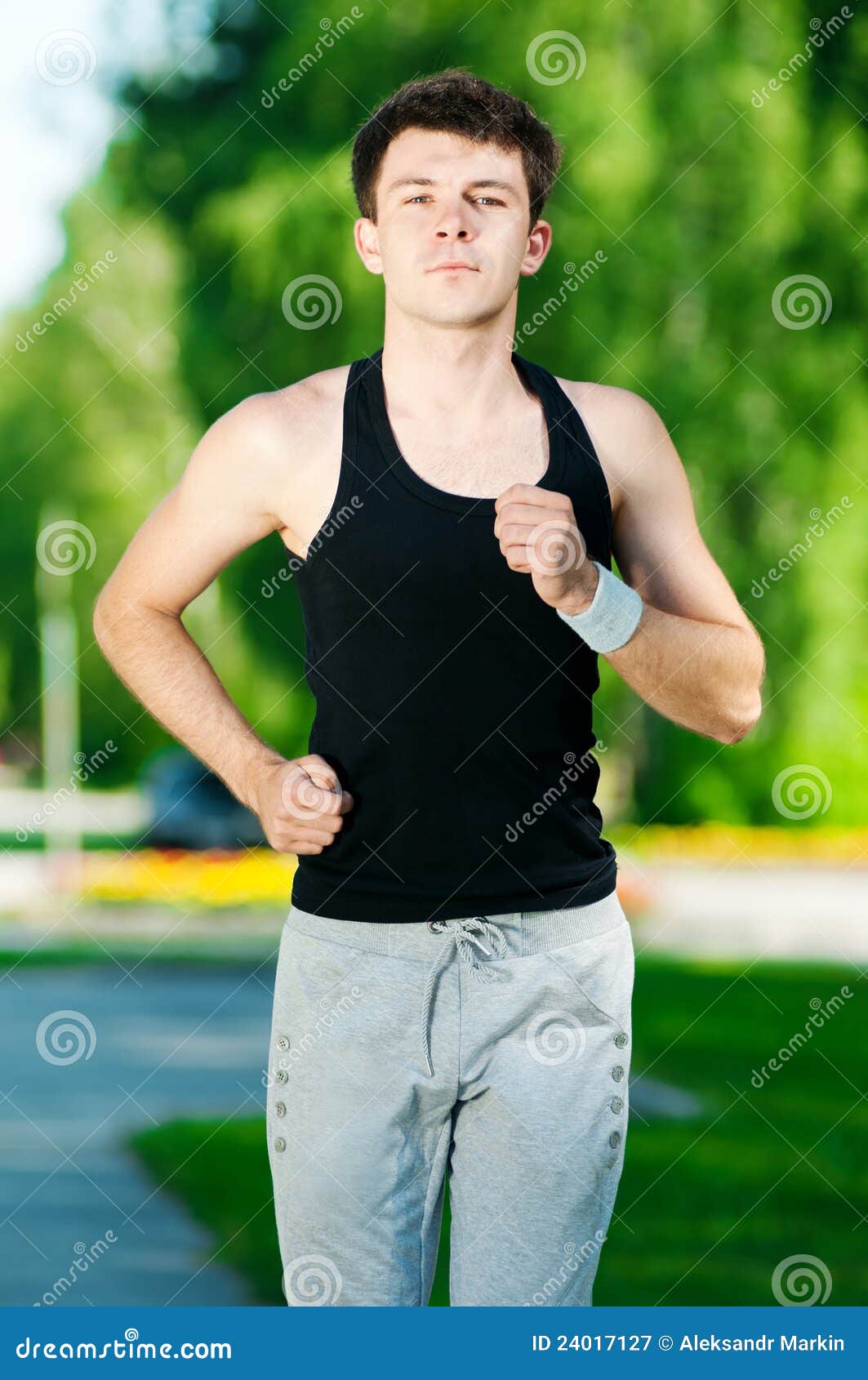 Young man jogging in park stock image. Image of jogger - 24017127