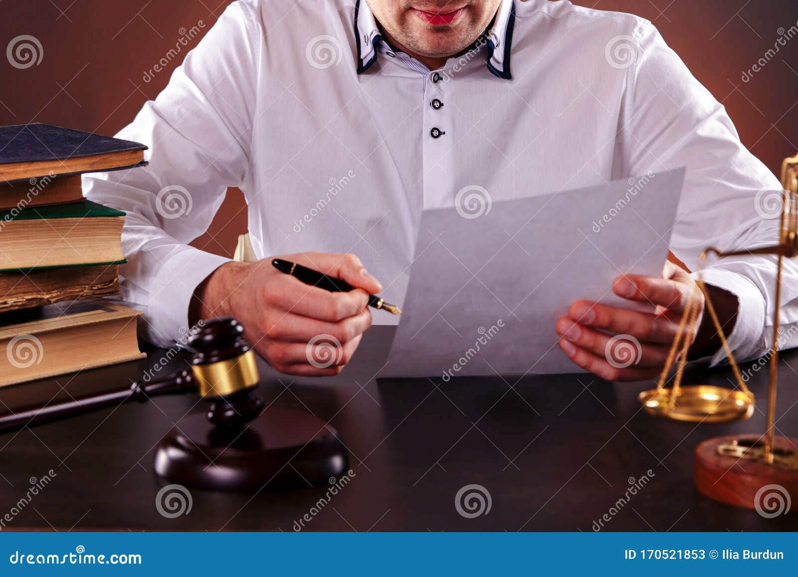 Young Man Judge on His Table Working with Paper Documents. Stock Image ...