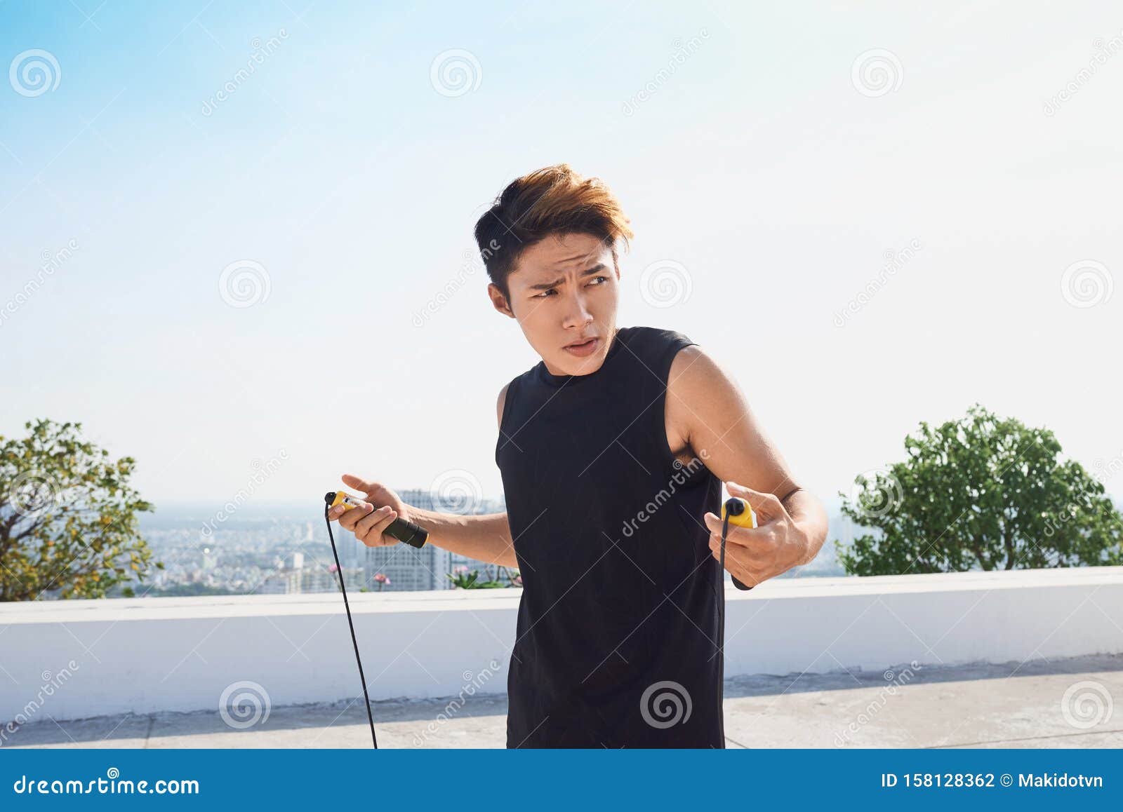 Young Man Jump Roping in the Outdoors Stock Photo - Image of skipping ...
