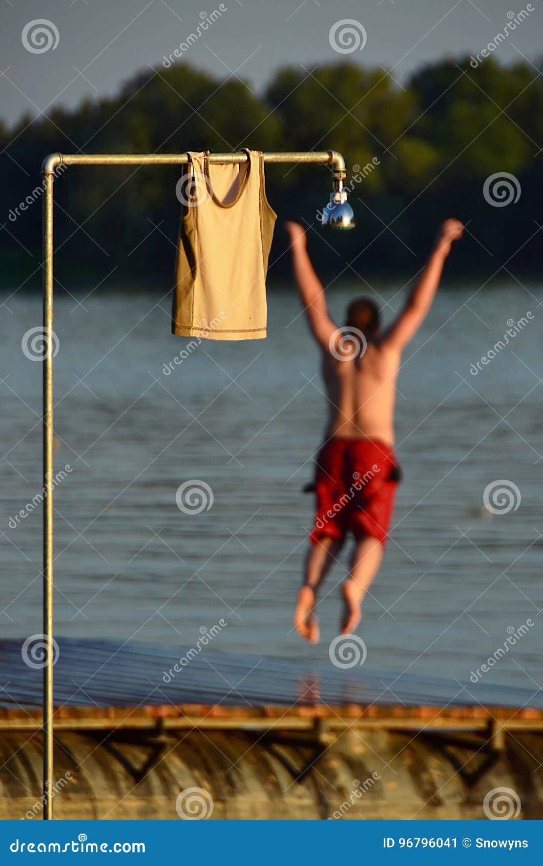 Young Man Jump into the Water Stock Image - Image of excitement, energy ...