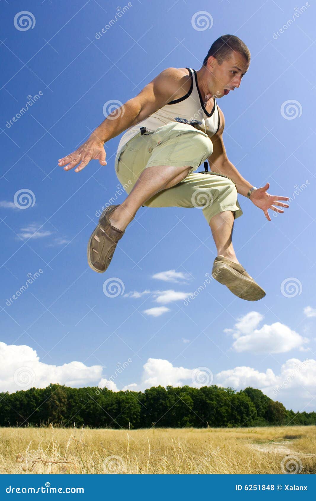 Young man jumping stock photo. Image of male, natural - 6251848