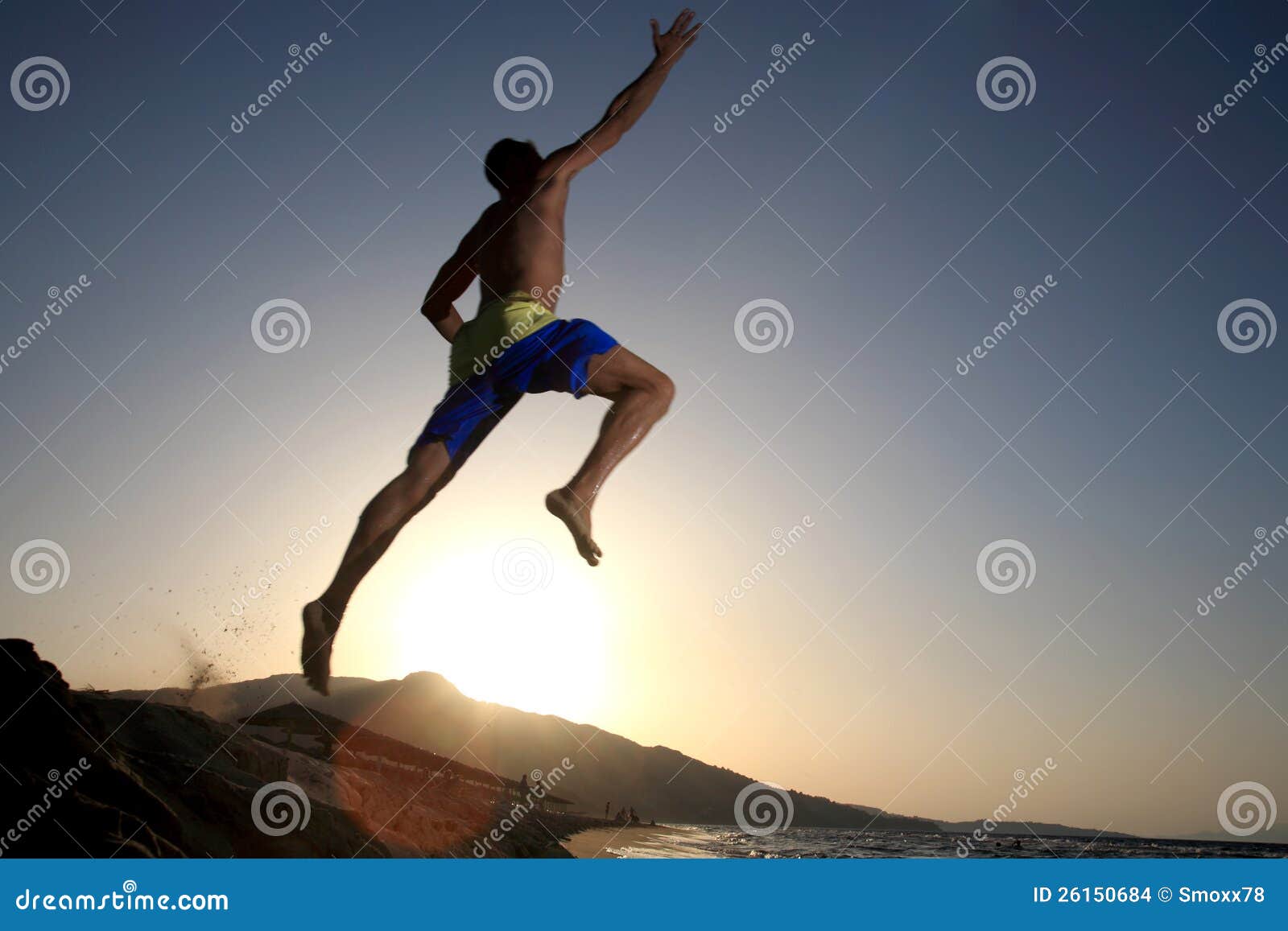 Young Man Jumping in the Air Stock Photo - Image of beautiful, jumping ...