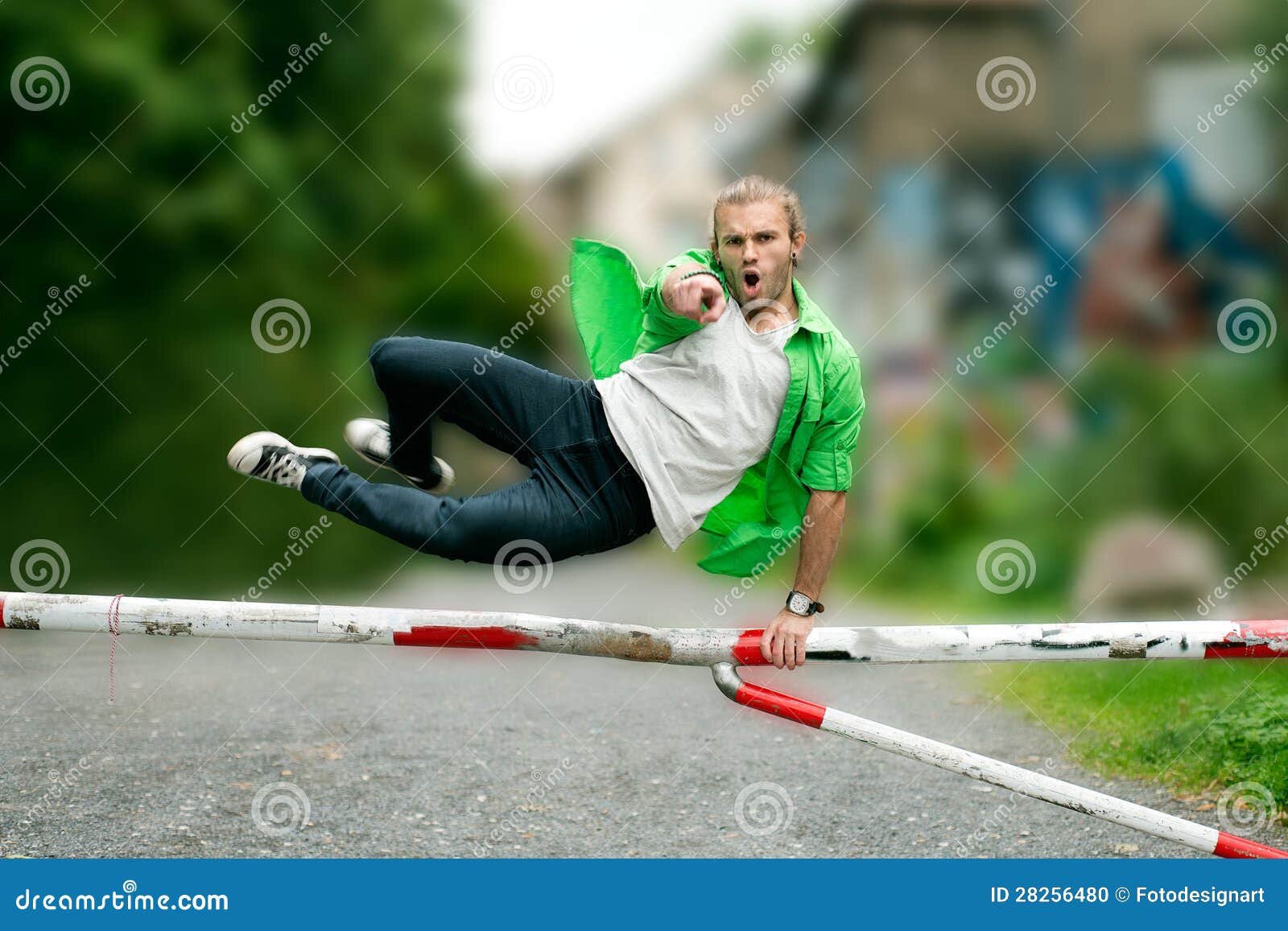 Young Man is Jumping Over a Barrier Stock Photo - Image of dynamic ...