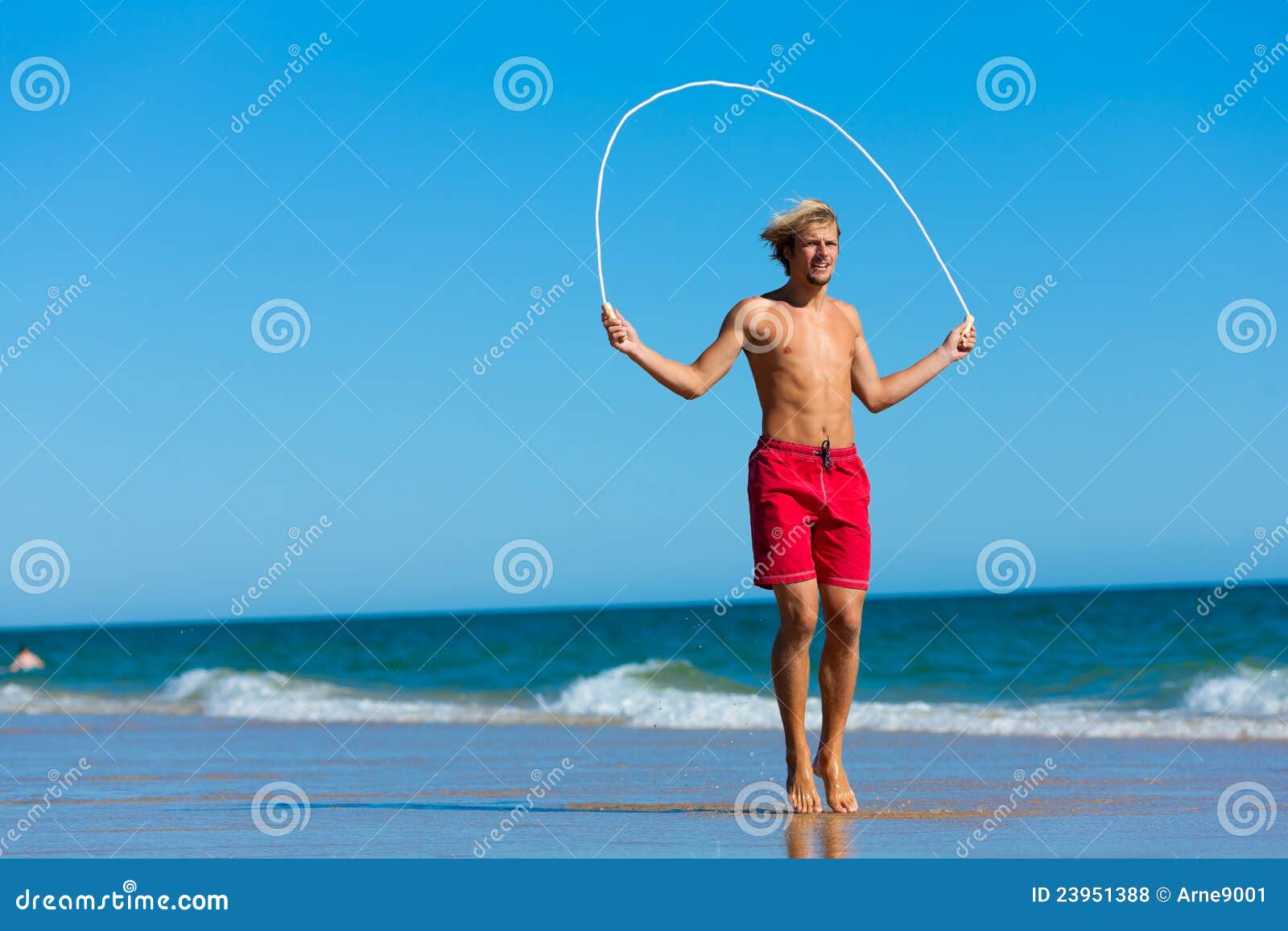 Young Man Jumping Rope at the Beach Stock Photo - Image of summer ...