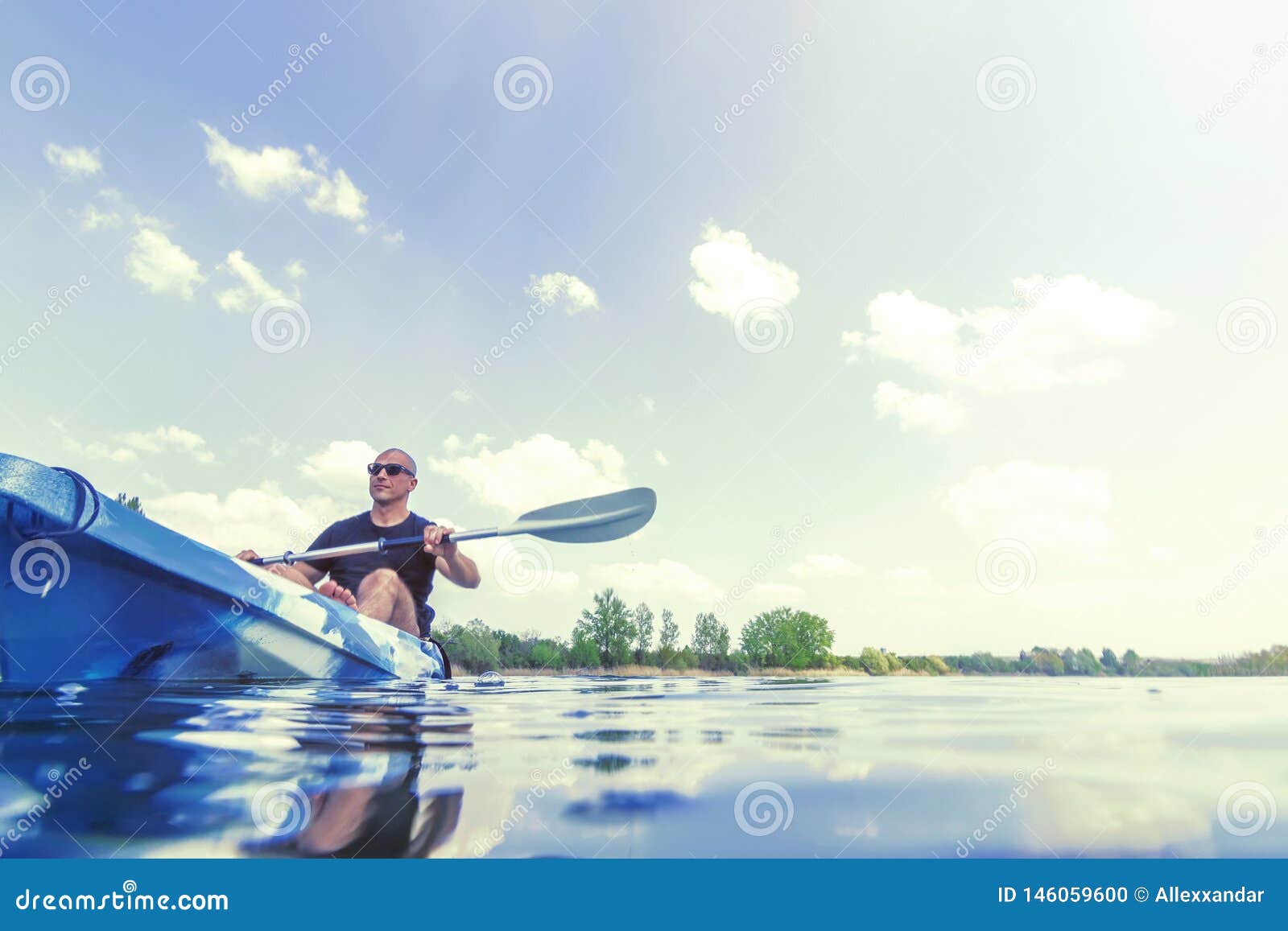 Young Man Kayaking on Lake. Lake Kayaking Stock Photo - Image of ...