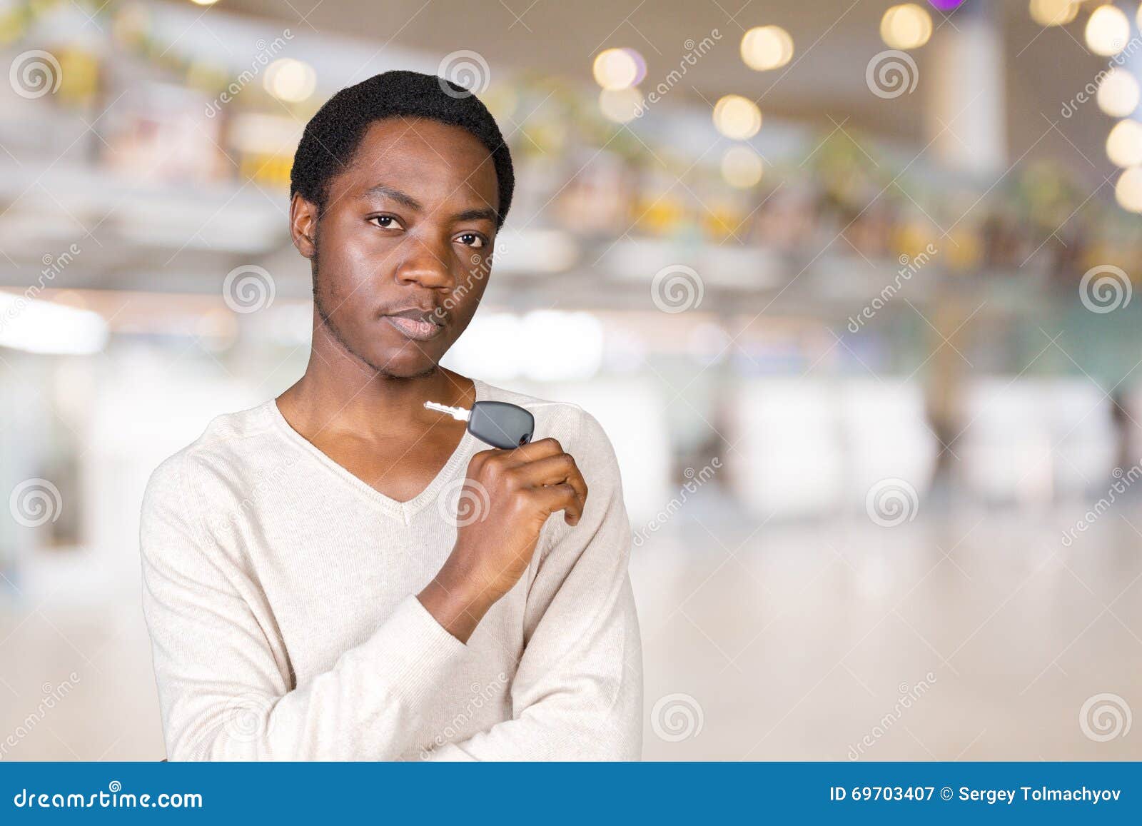 Young man with the keys stock image. Image of adult, people - 69703407